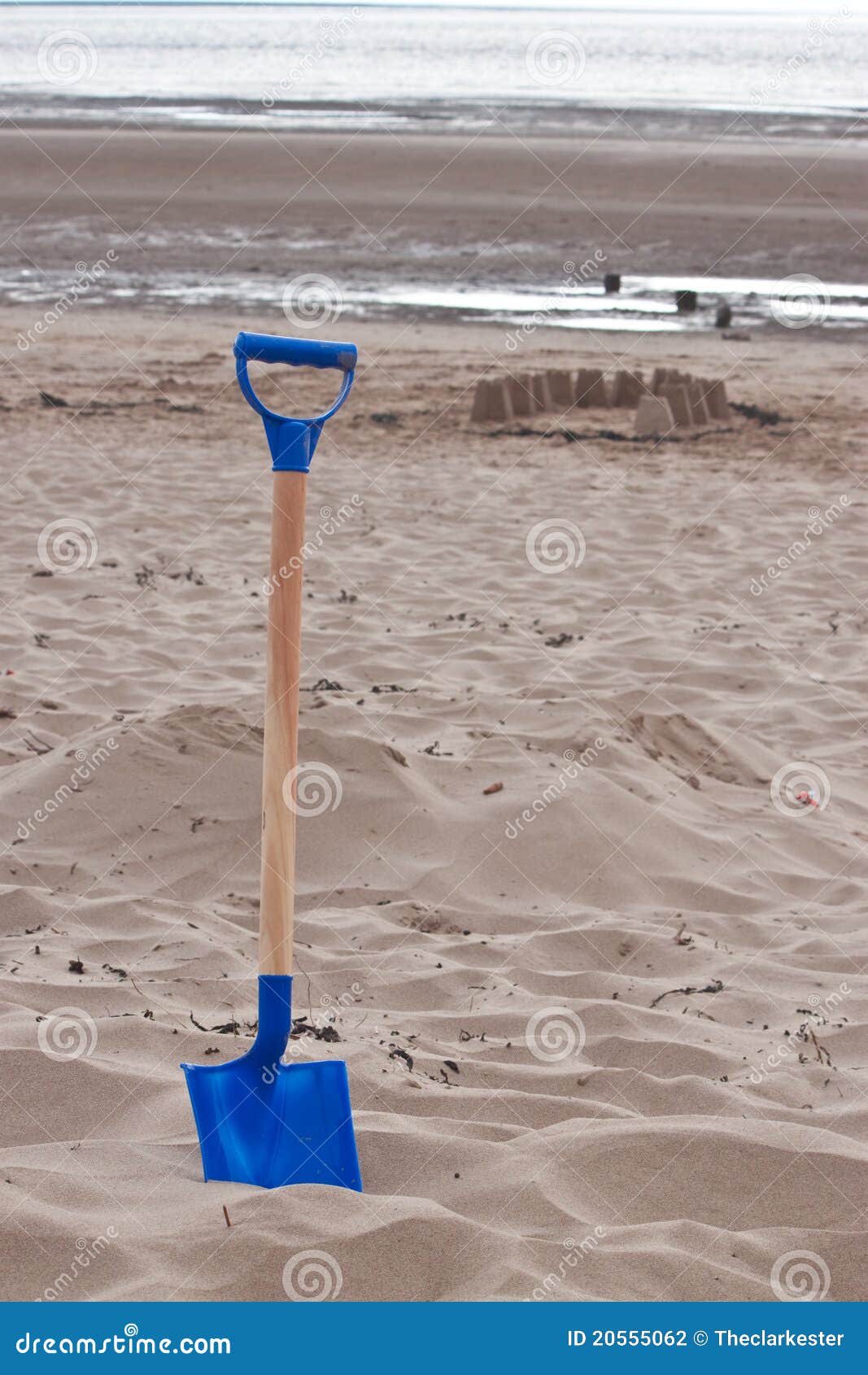 Blue Spade with Sandcastles Stock Photo - Image of coast, bright: 20555062