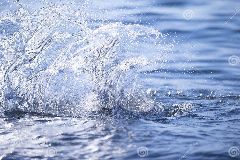 Blue splashes of sea water stock photo. Image of surf - 297907328