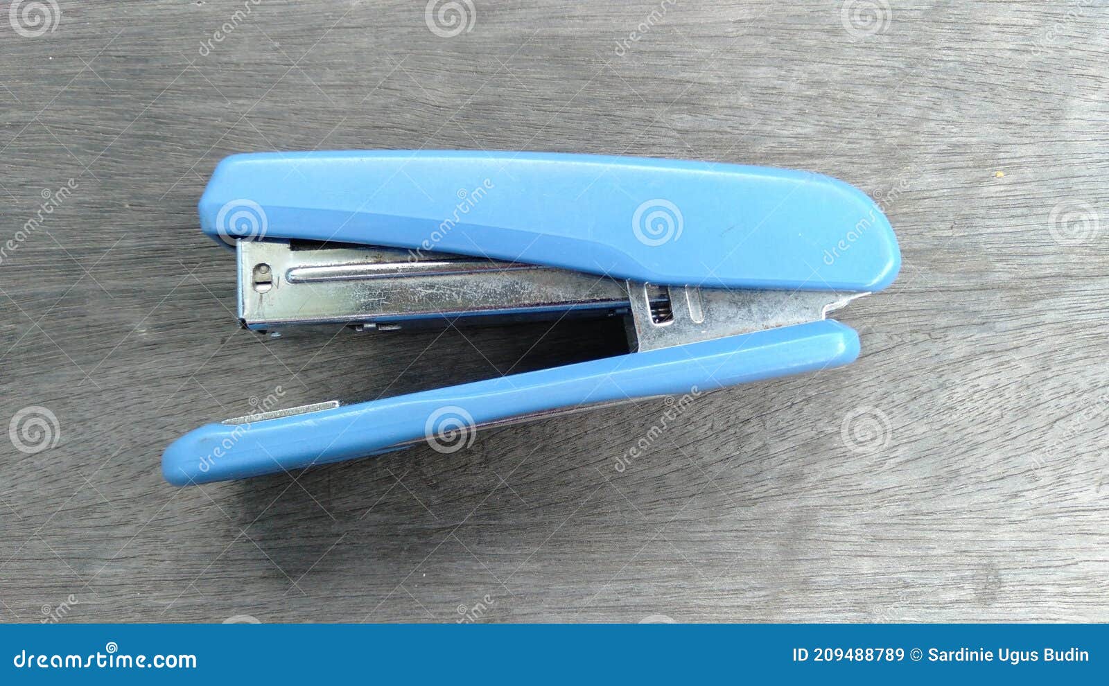 Blue Staple on the Plank Floor Stock Image - Image of tire, plank ...