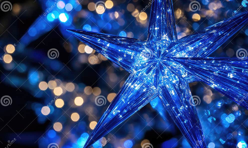 A Blue Star with a Blue Light Shining on it Stock Photo - Image of xmas ...