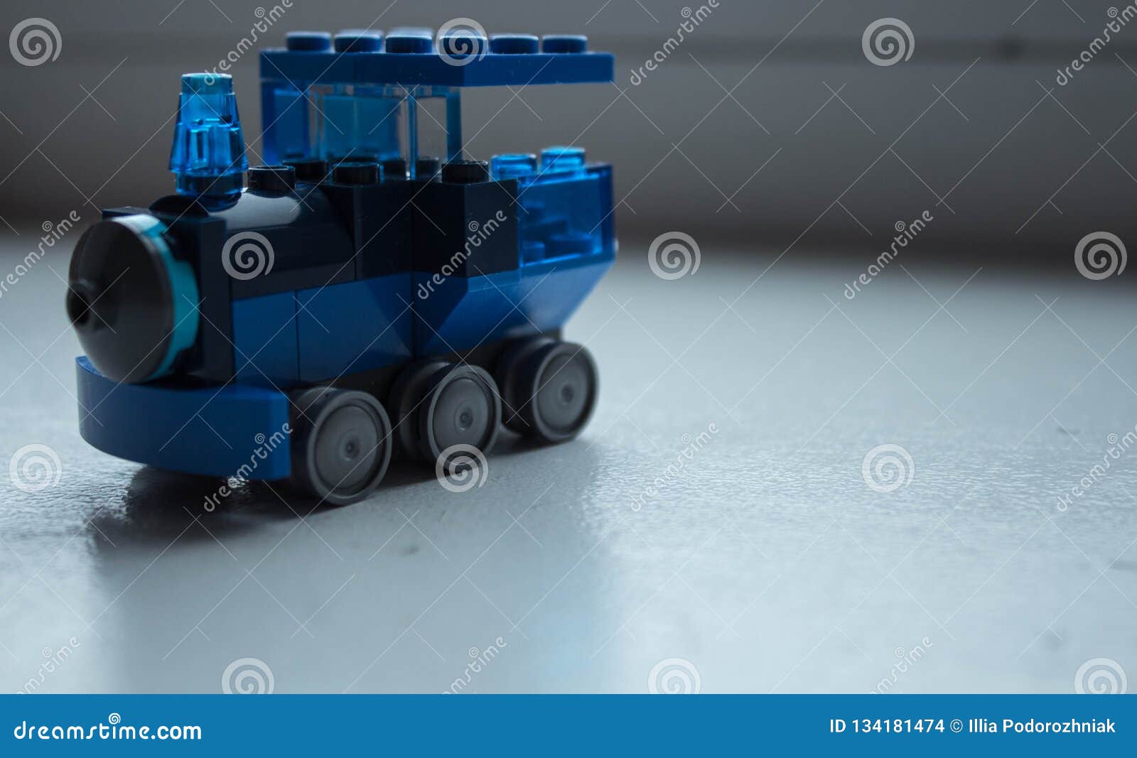 A Blue Steam Train with a Designer Stock Photo - Image of preschool ...