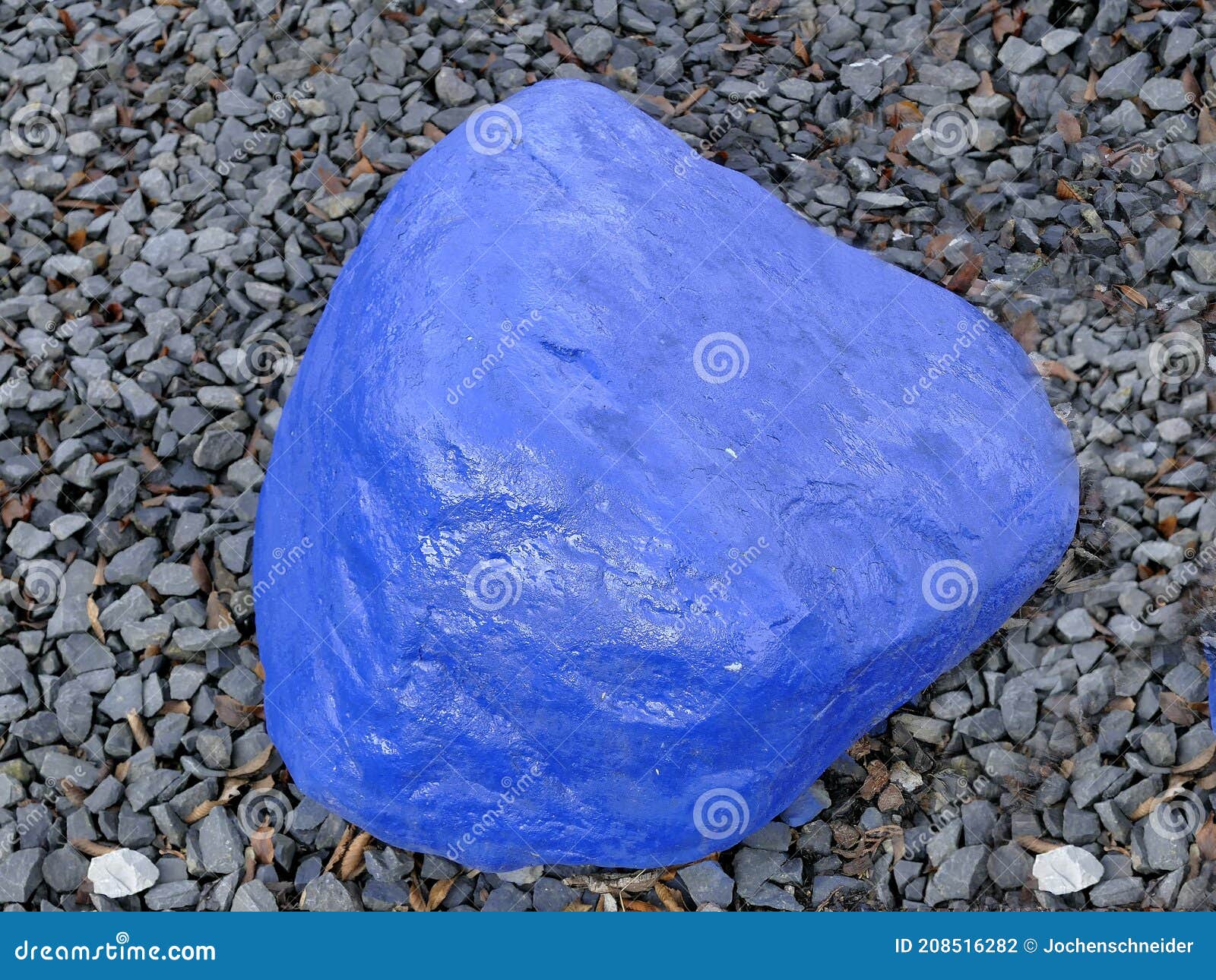 Blue Stone in a Garden on Grit Stock Photo - Image of catcher ...