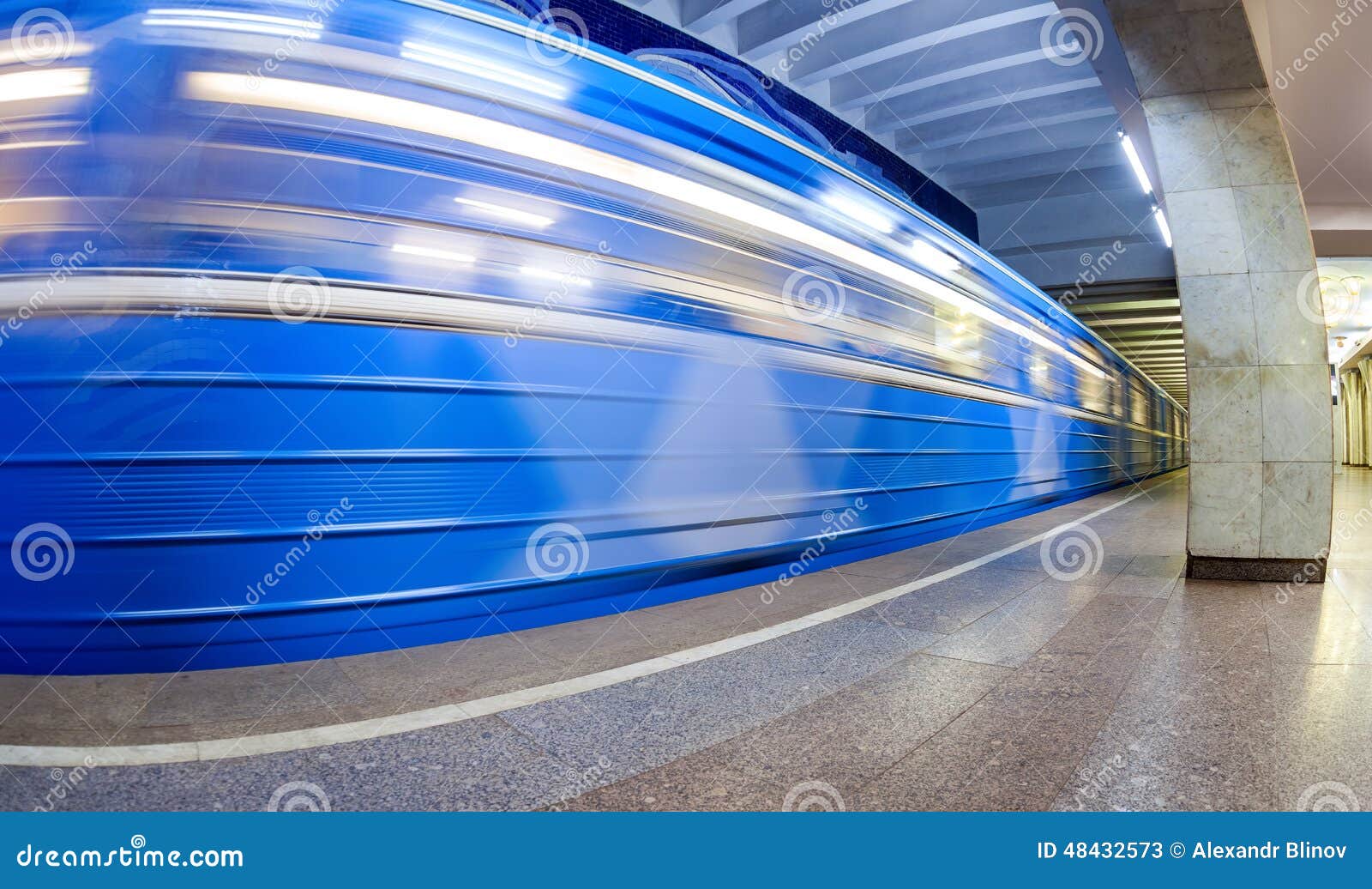 Blue Subway Train in Motion at the Underground Station. Wide Angle ...