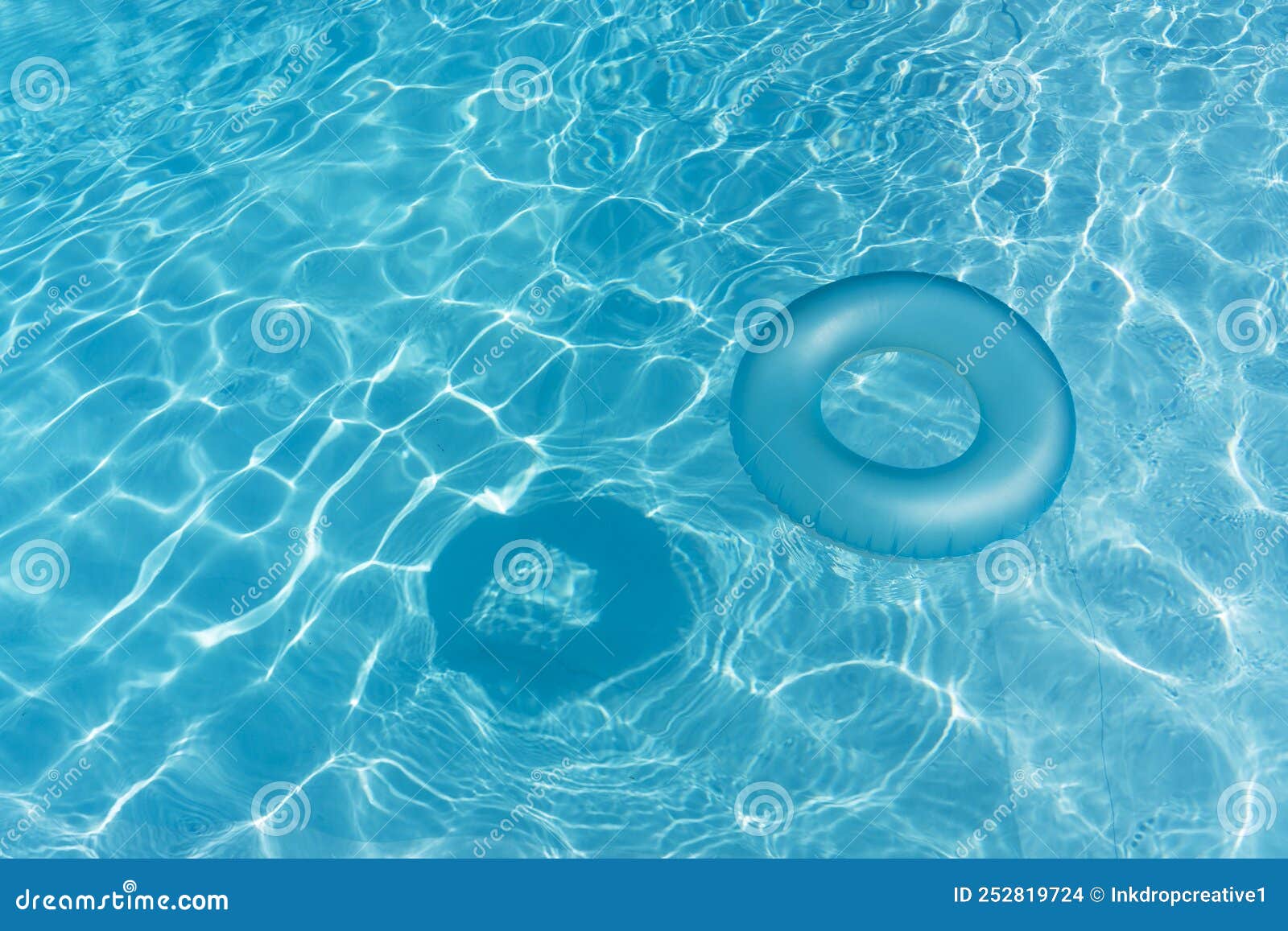 Blue Summer Pool Rubber Ring Floating on a Vacation Swimming Pool Stock ...