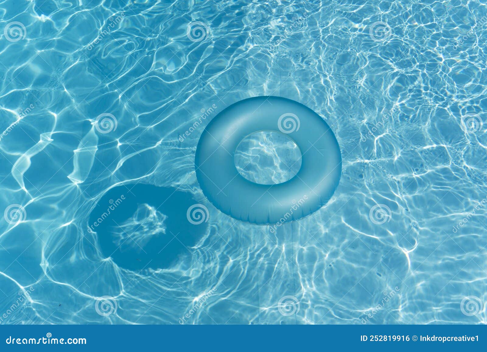 Blue Summer Pool Rubber Ring Floating on a Vacation Swimming Pool Stock ...