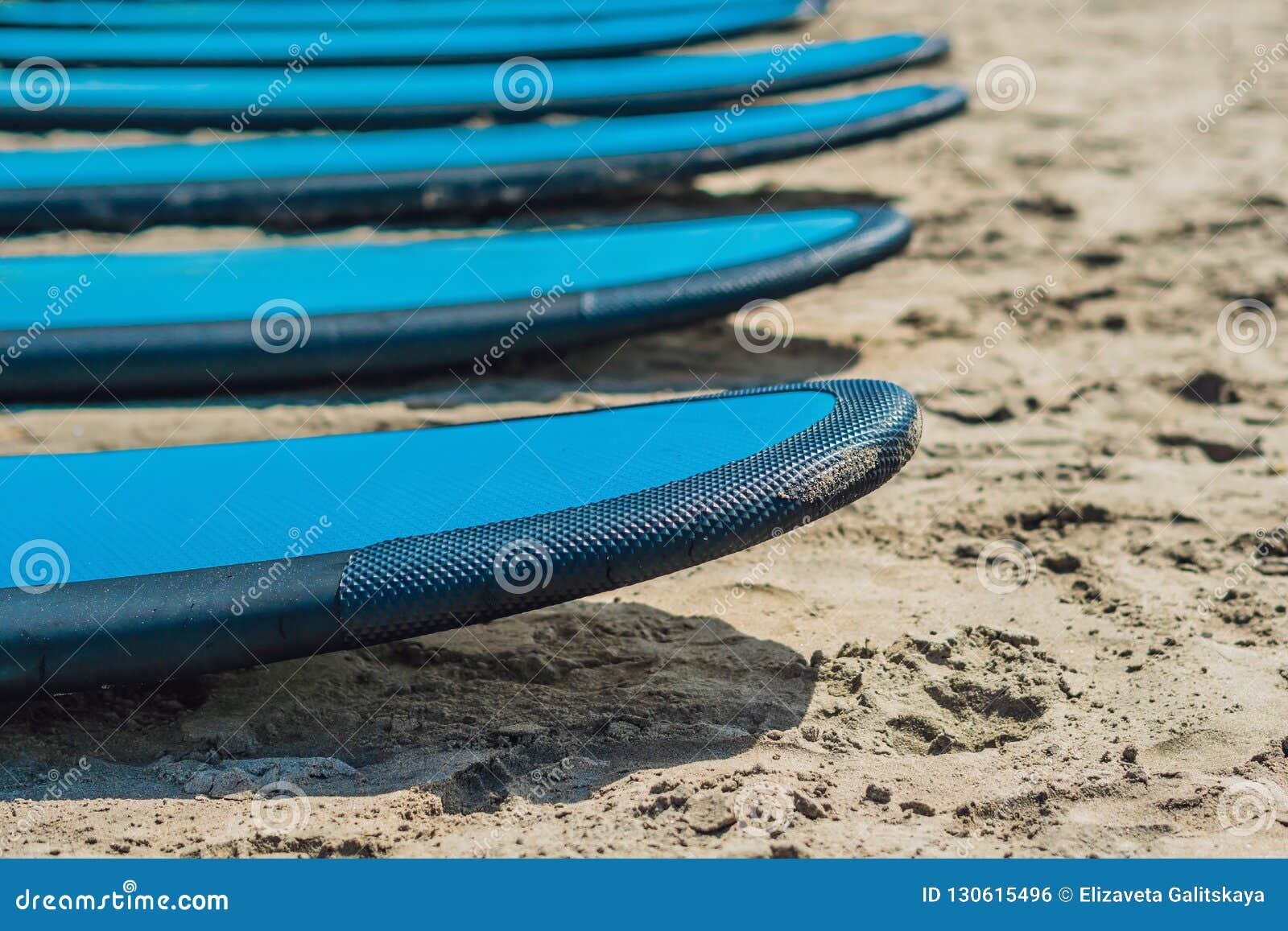 Blue Surfboards in the Sand on the Beach Stock Photo - Image of color ...
