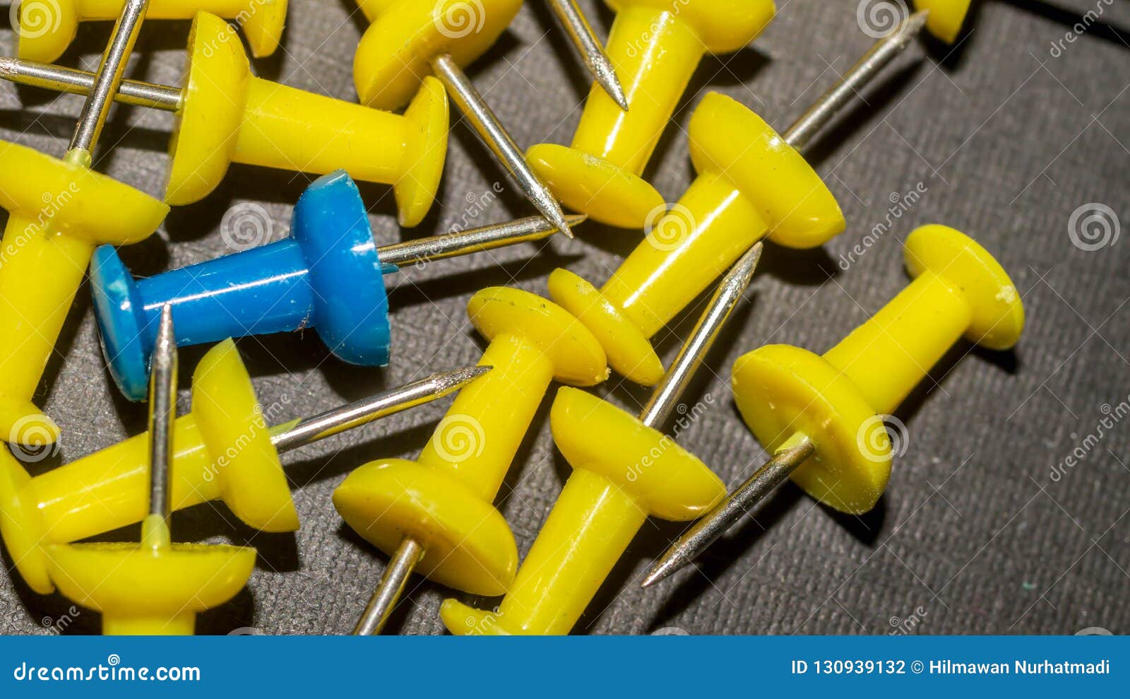 Blue Surrounded by Yellow Push Pins. Stock Photo - Image of colors ...