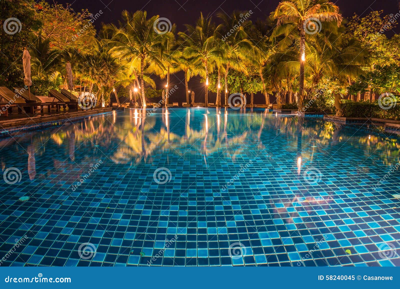 Blue Swimming Pool with Light Reflections at Night Stock Image - Image ...