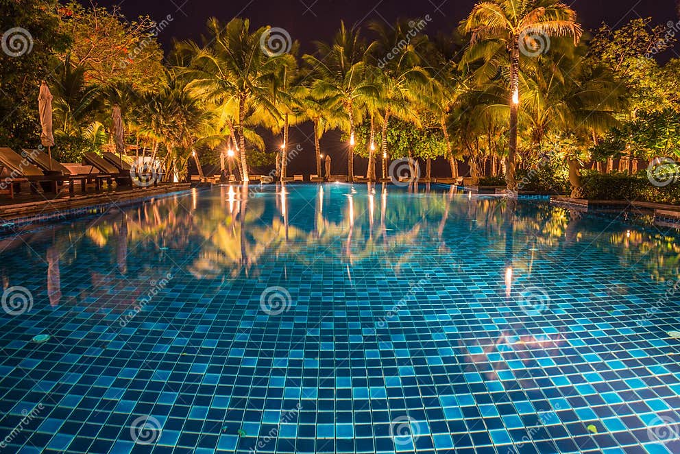 Blue Swimming Pool with Light Reflections at Night Stock Image - Image ...