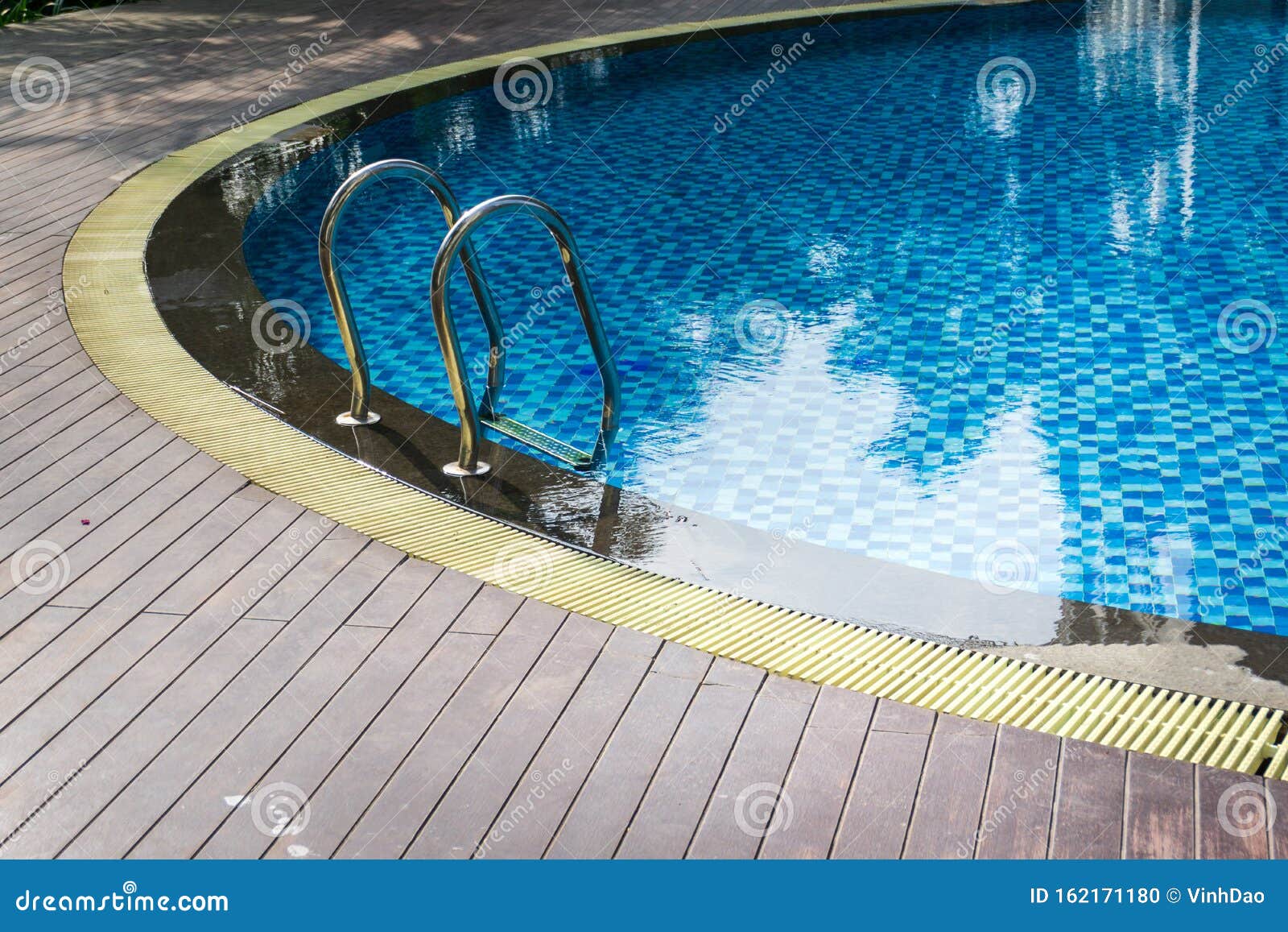 Blue Swimming Pool with Wood Flooring Stripes Stock Photo - Image of ...