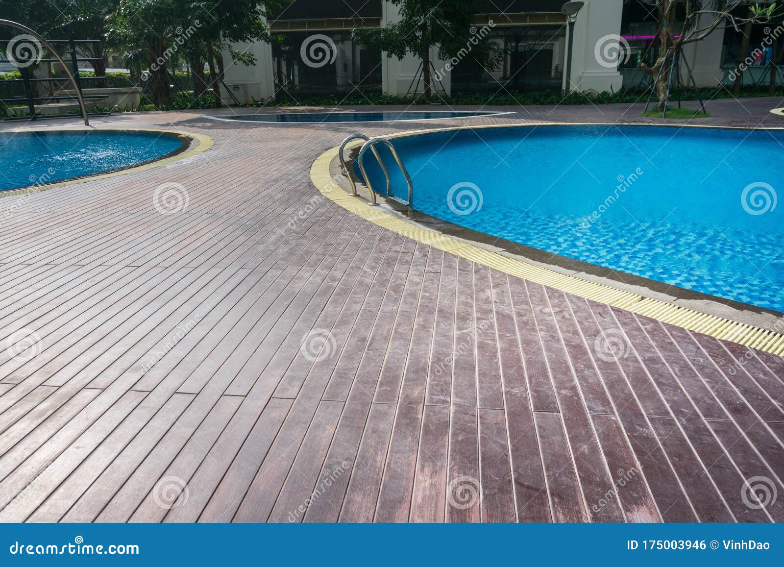 Blue Swimming Pool with Wood Flooring Stripes Stock Photo - Image of ...