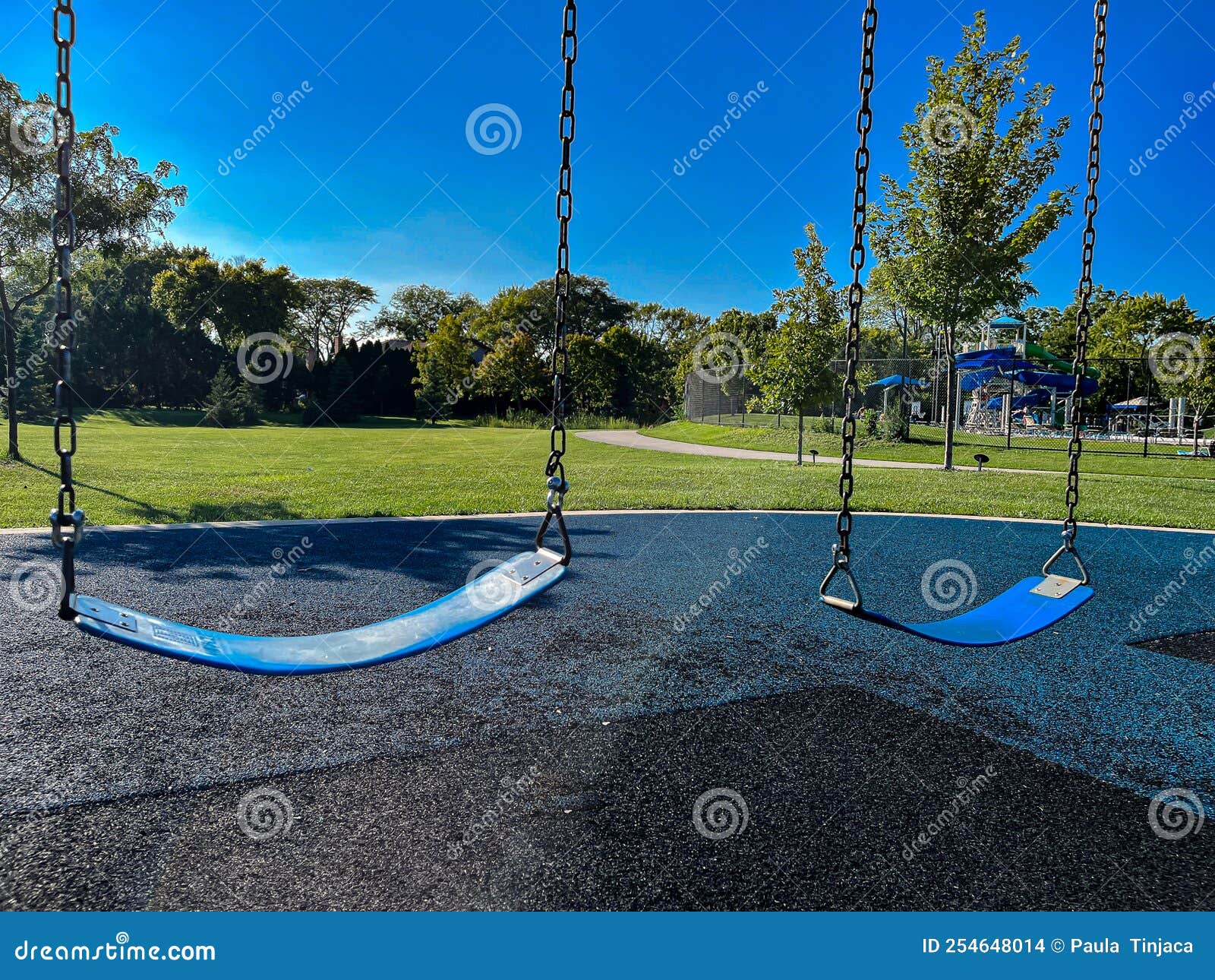 Blue Swing Set at Empty Park Stock Photo - Image of empty, swings ...
