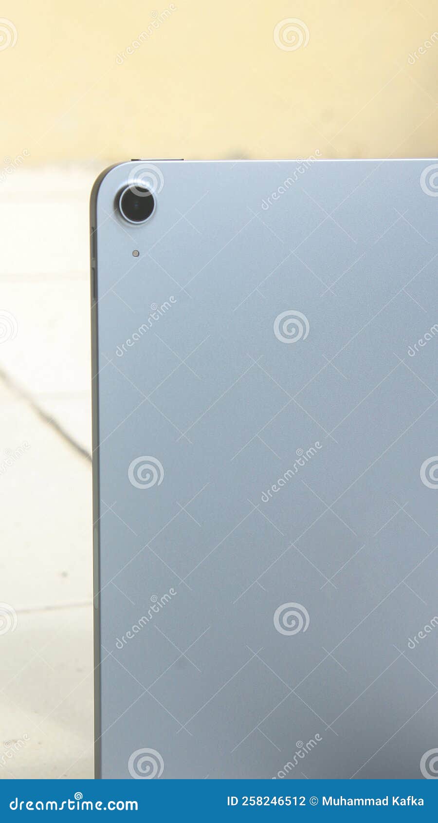 A Blue Tablet from back stock photo. Image of hitech - 258246512