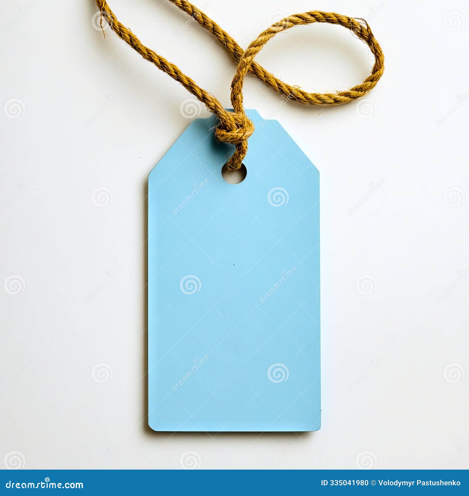 A Blue Tag with a String Tied Around it Stock Photo - Image of rope ...