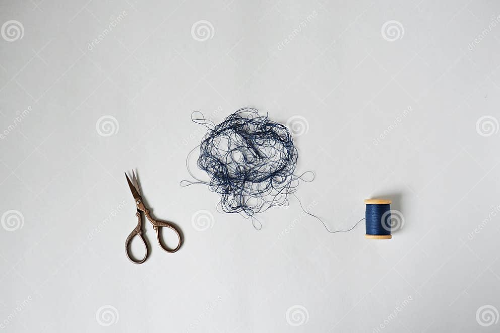 Blue Tangle Thread Spool and Scissors Stock Image - Image of mood, blue ...