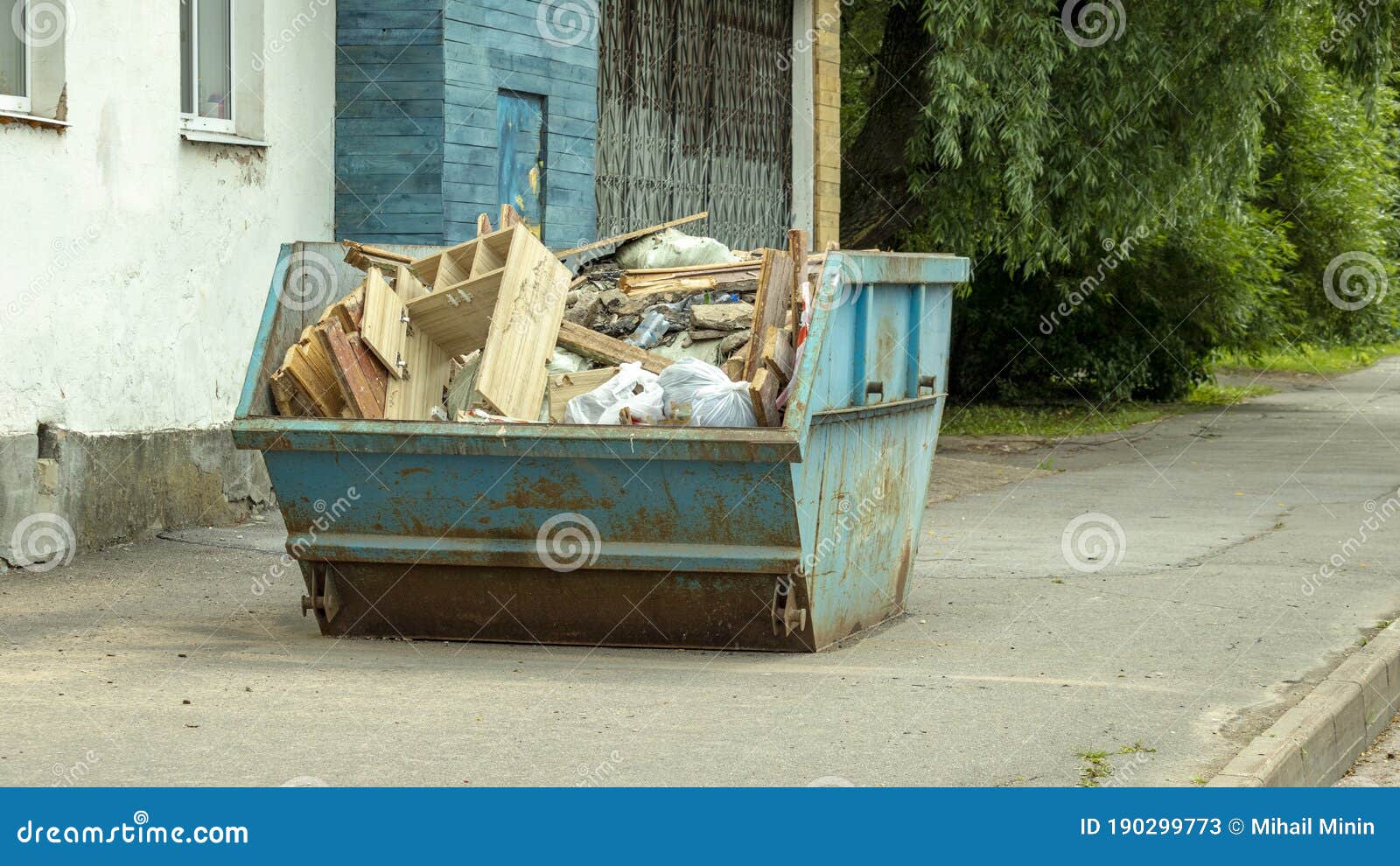 Blue Tank with Construction Debris Stock Image - Image of broken ...