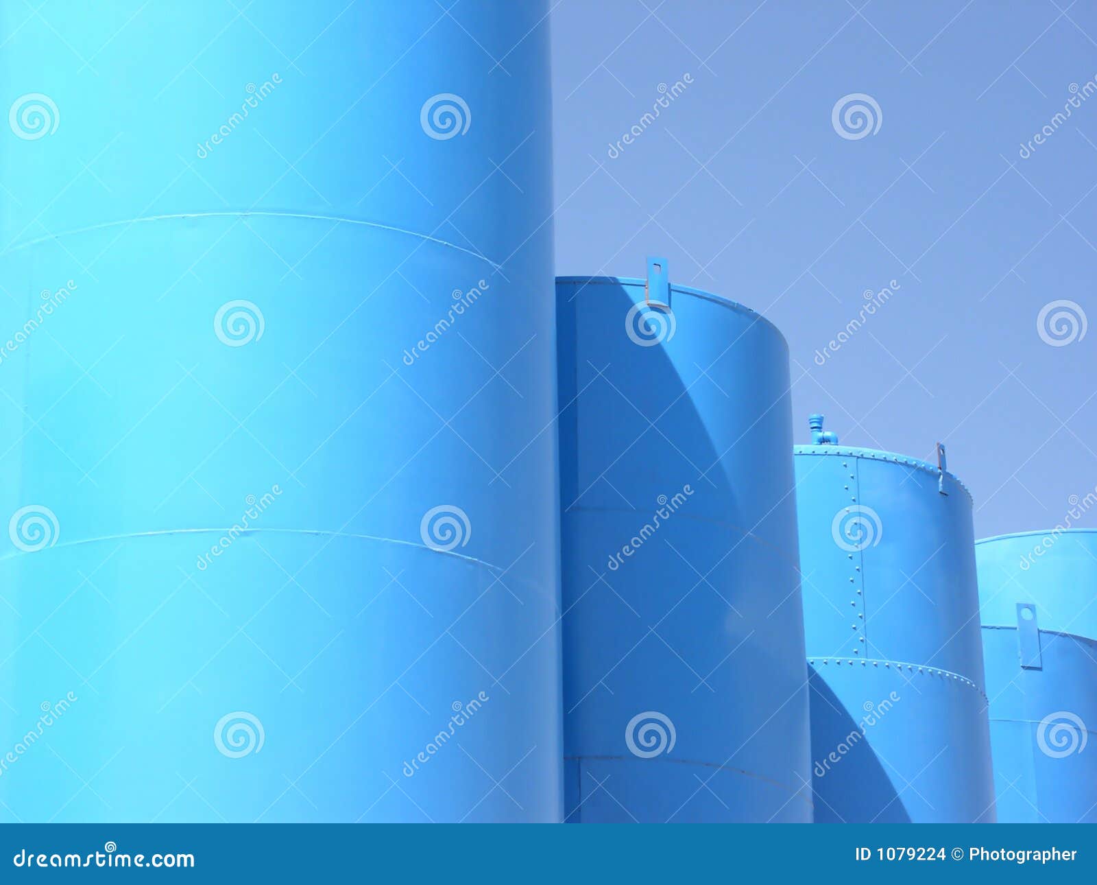 Blue Tanks stock photo. Image of agriculture, tank, cylinder - 1079224
