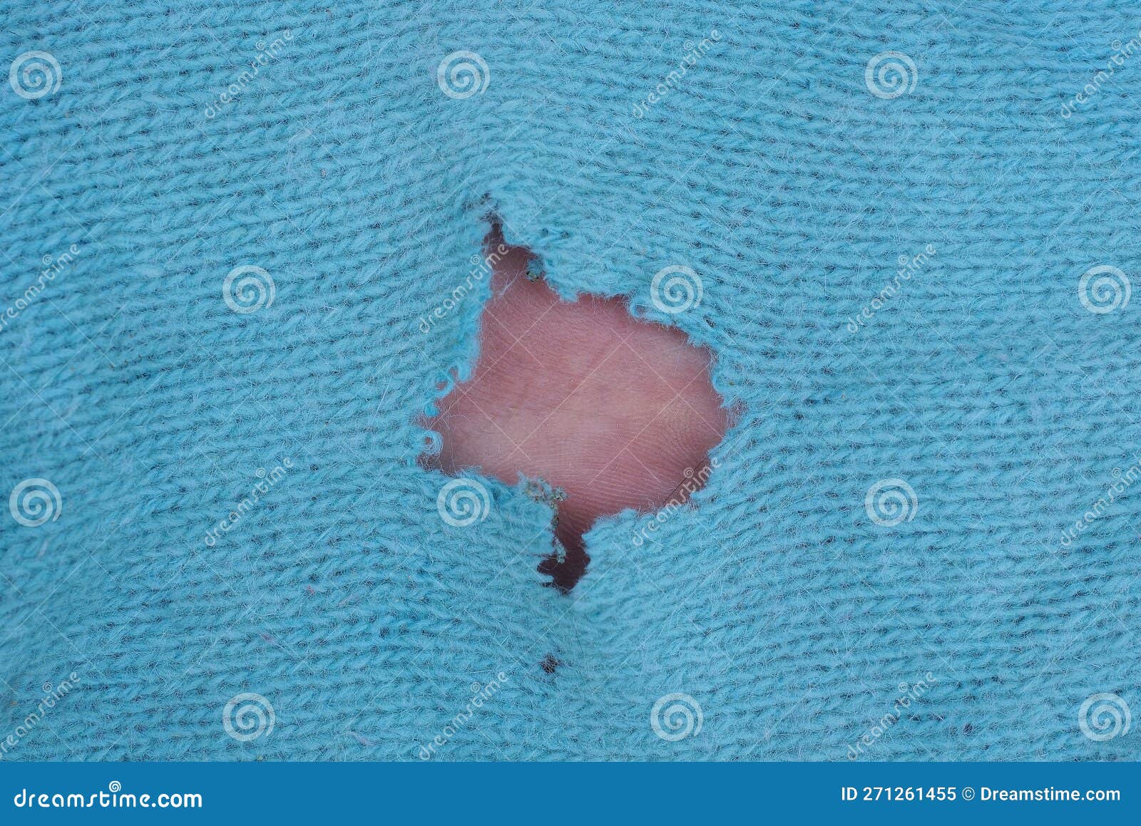 Blue Texture of Woolen Torn Fabric with a Brown Hole Stock Image ...