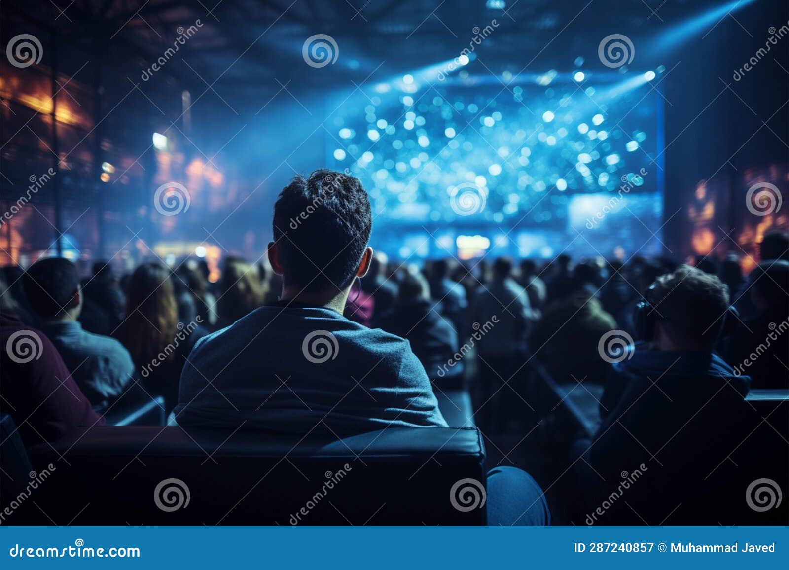 Blue Themed Conference Rear View of Attendees, United in Knowledge ...