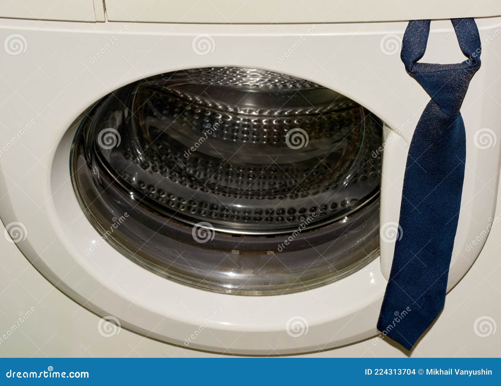 He Blue Tie Hangs on the White Washing Automatic Machine Stock Photo ...