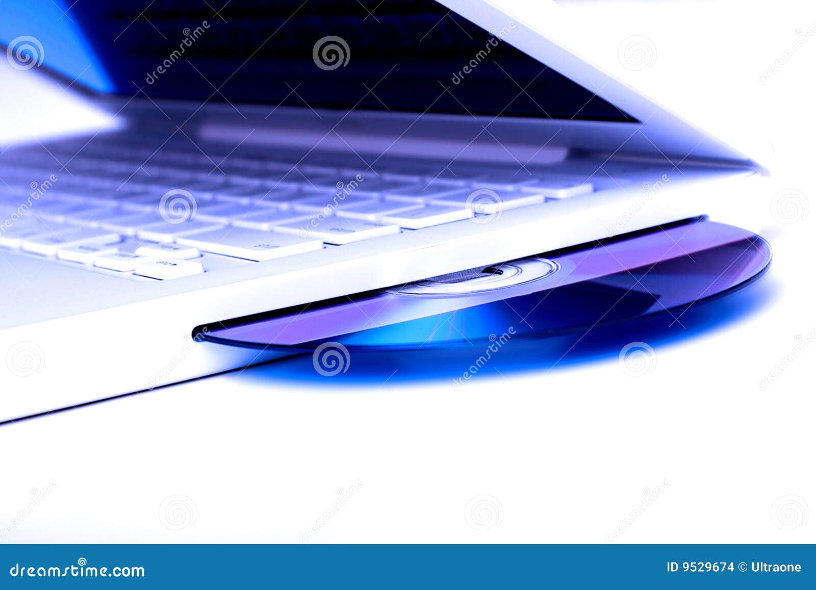 Blue Tint White Laptop with Dvd Disk. Stock Photo - Image of violet ...