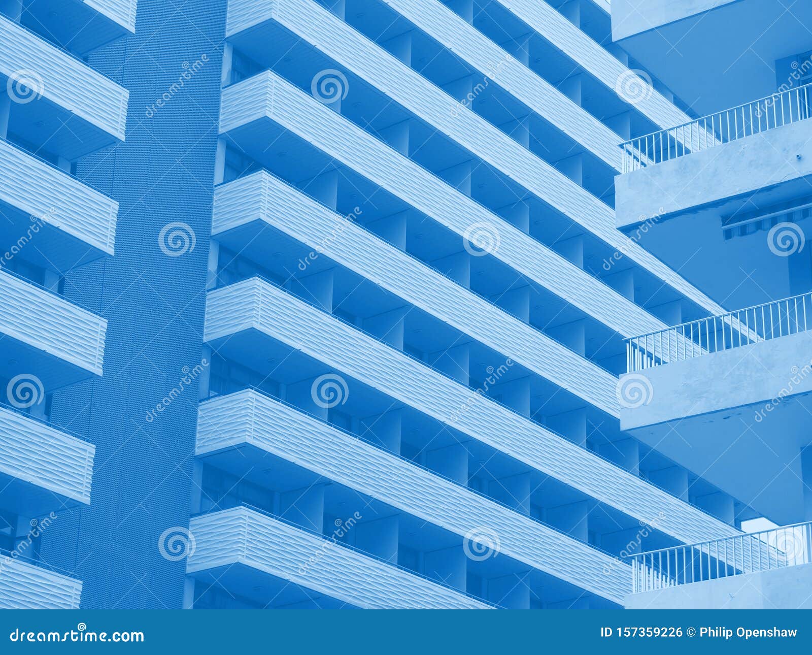 Blue Toned Abstract Image of Large Modern Highrise Modern Apartment ...