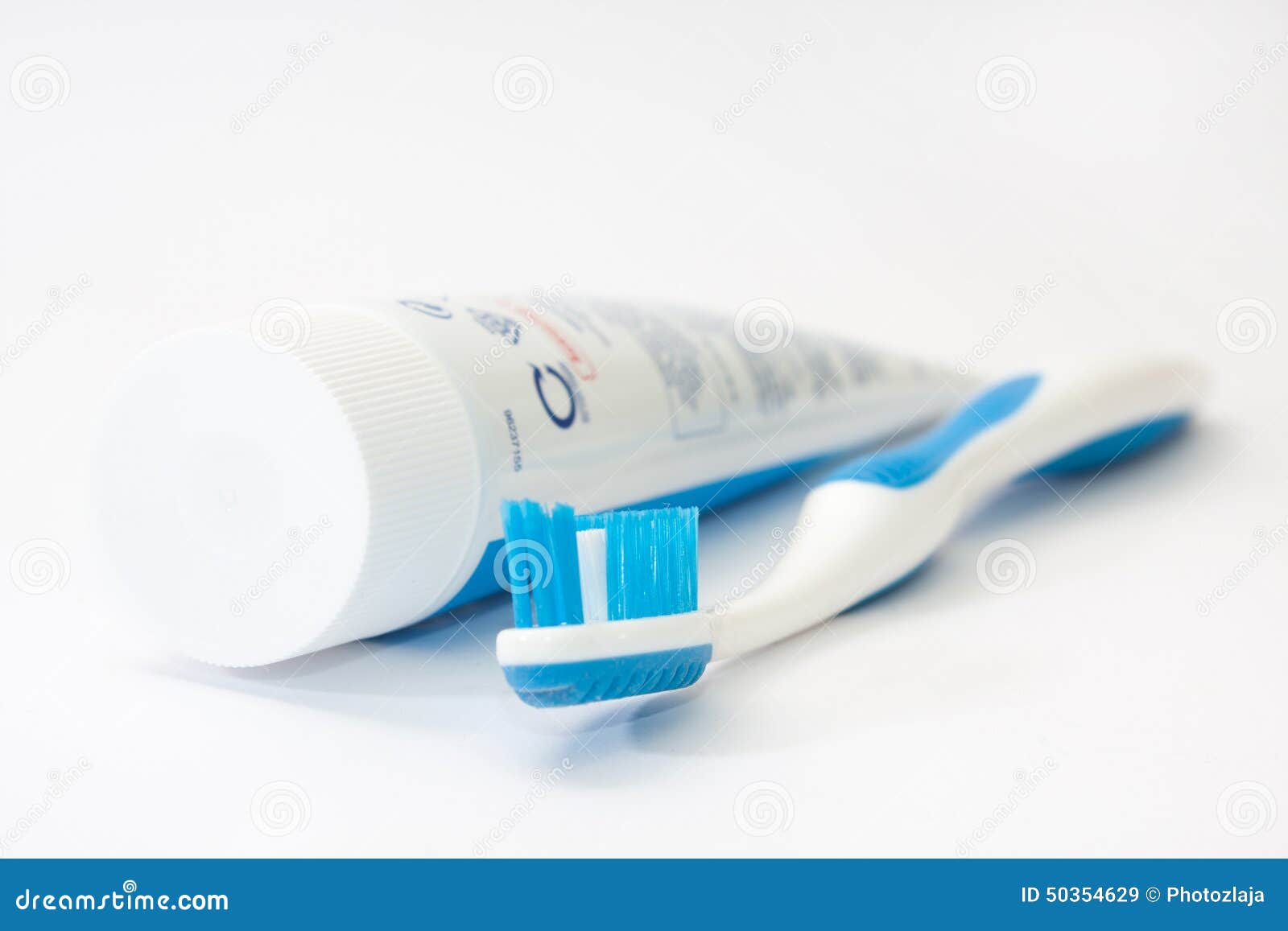 Blue Toothbrush and Toothpaste Stock Image - Image of blue, fluoride ...