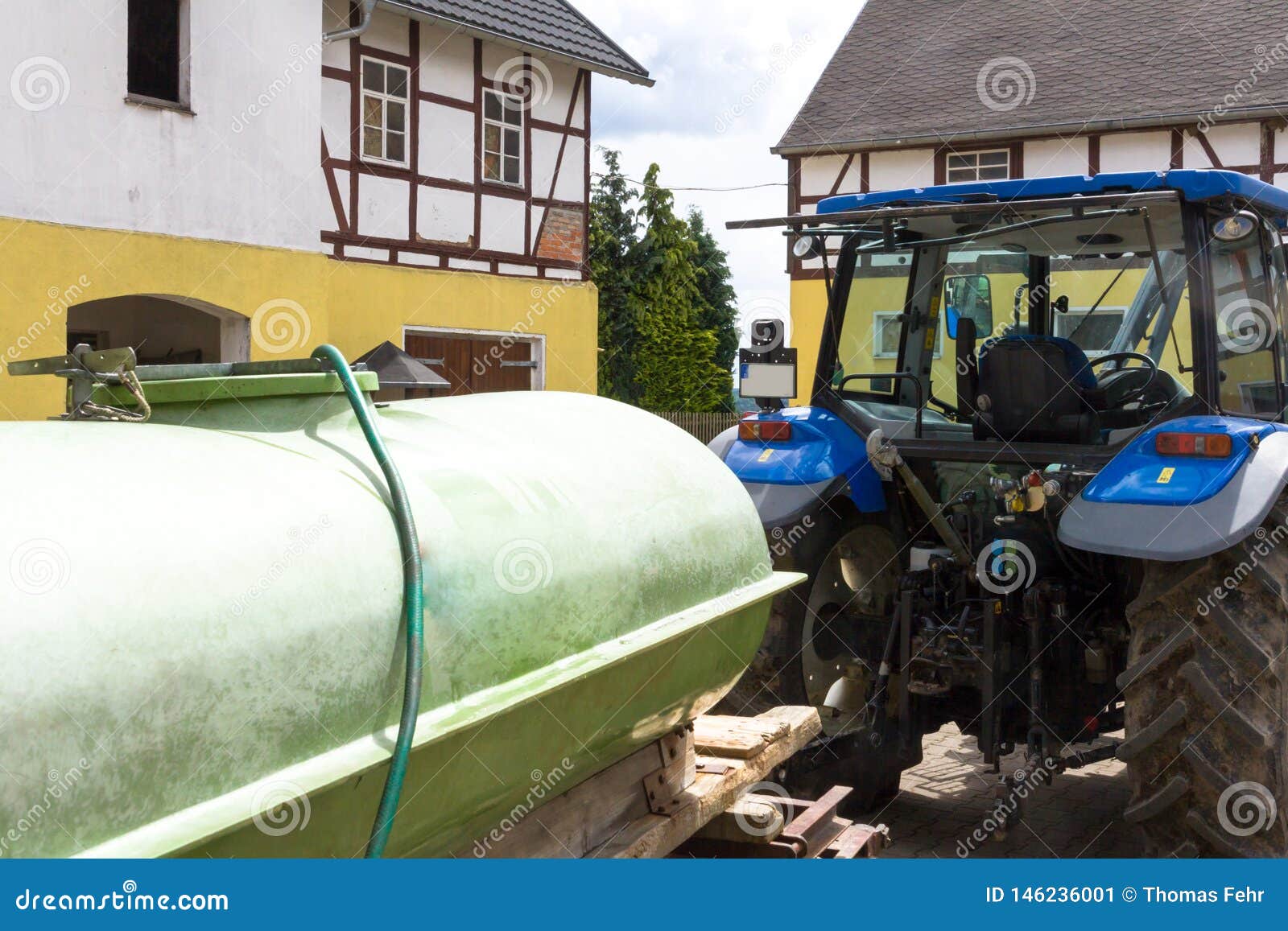 Tractor with Trailer on a Farm Stock Image - Image of field, machinery ...