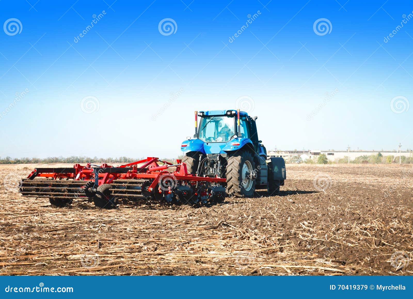 Blue Tractor Working in an Open Field Stock Image - Image of industrial ...