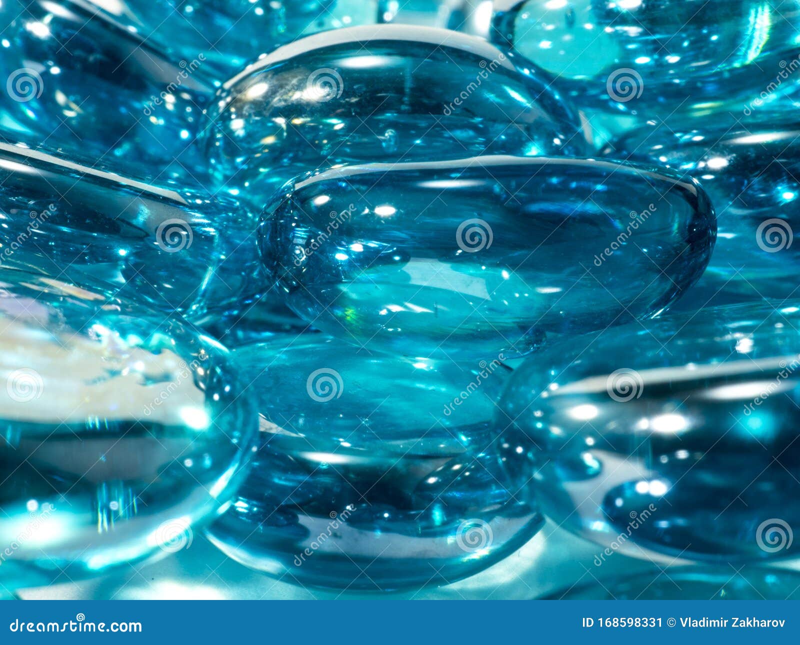 Blue Translucent Glass Stones with White Highlights on a White ...