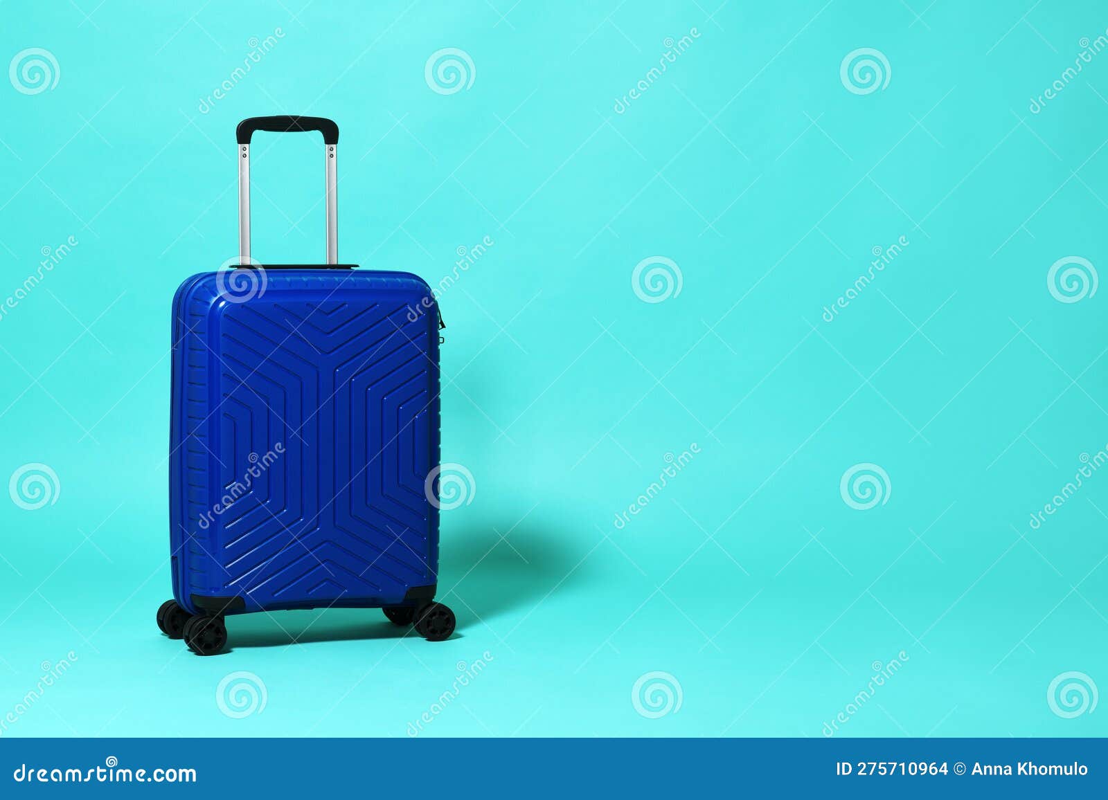 Blue trolley travel bag stock photo. Image of bright - 275710964