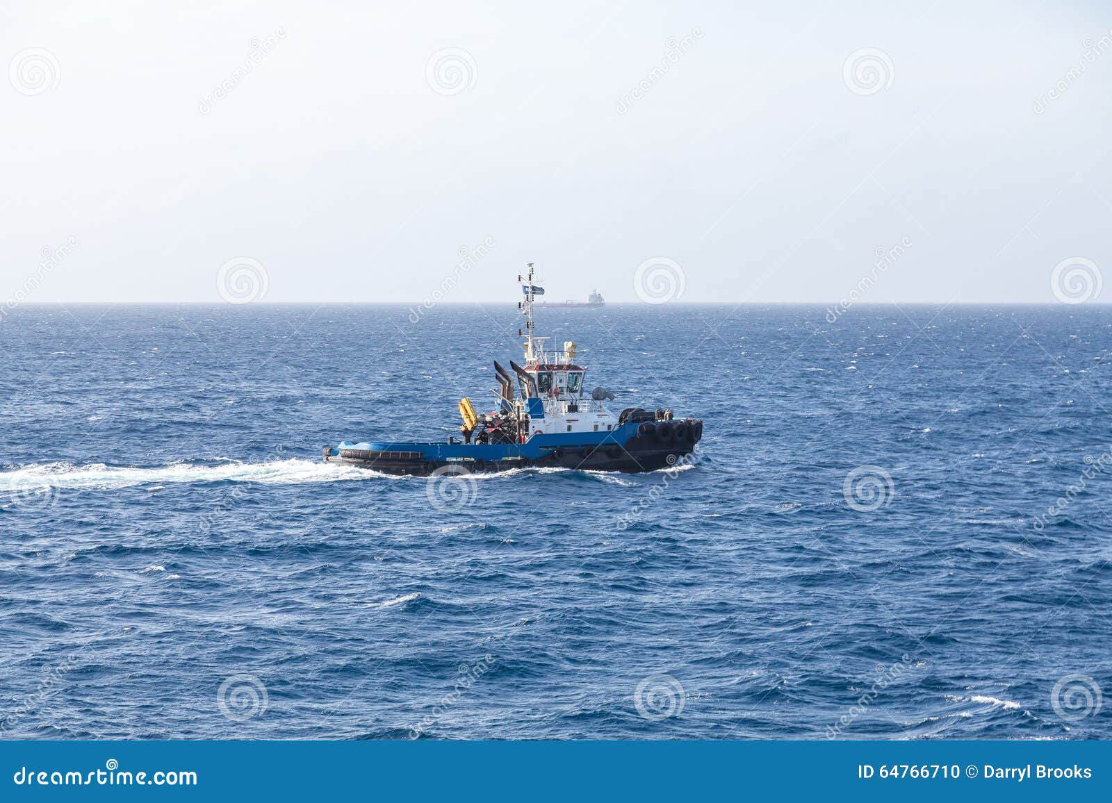 Blue Tugboat at Sea stock photo. Image of logistic, transportation ...