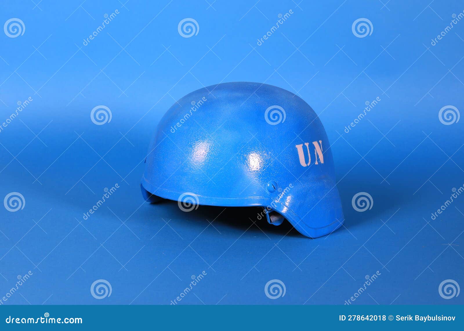 Blue UN Helmet Isolated on Blue Stock Photo - Image of classic, world ...