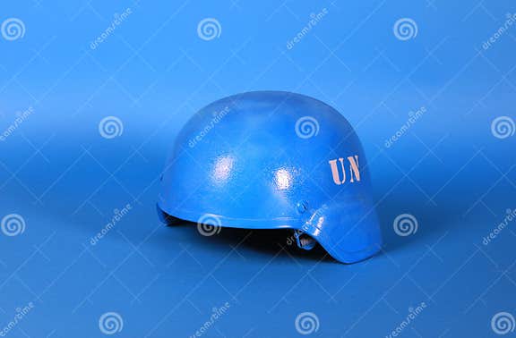 Blue UN Helmet Isolated on Blue Stock Photo - Image of classic, world ...