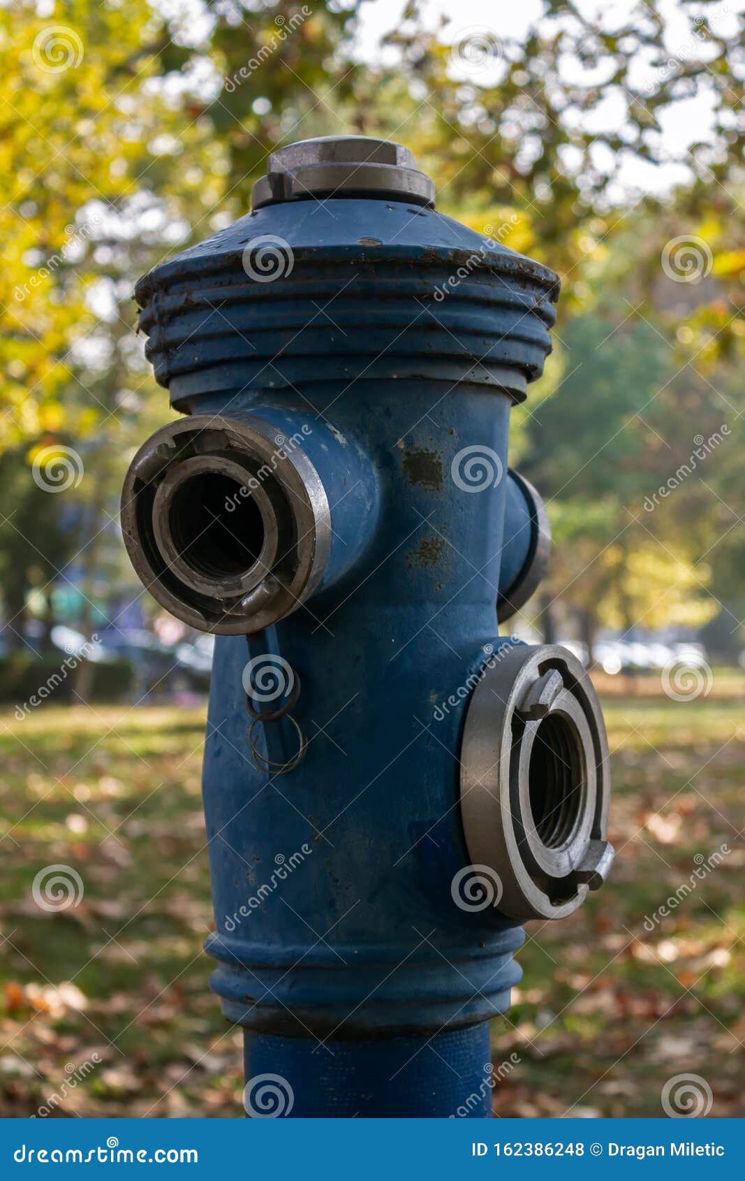 Blue underground hydrant stock photo. Image of pressure - 162386248