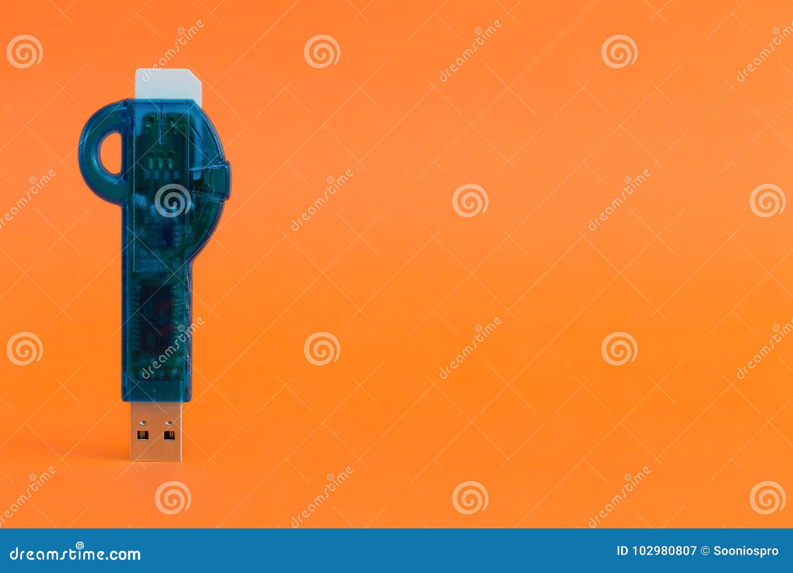 Blue USB Flash Memory on a Orange Background. Card Reader Included ...