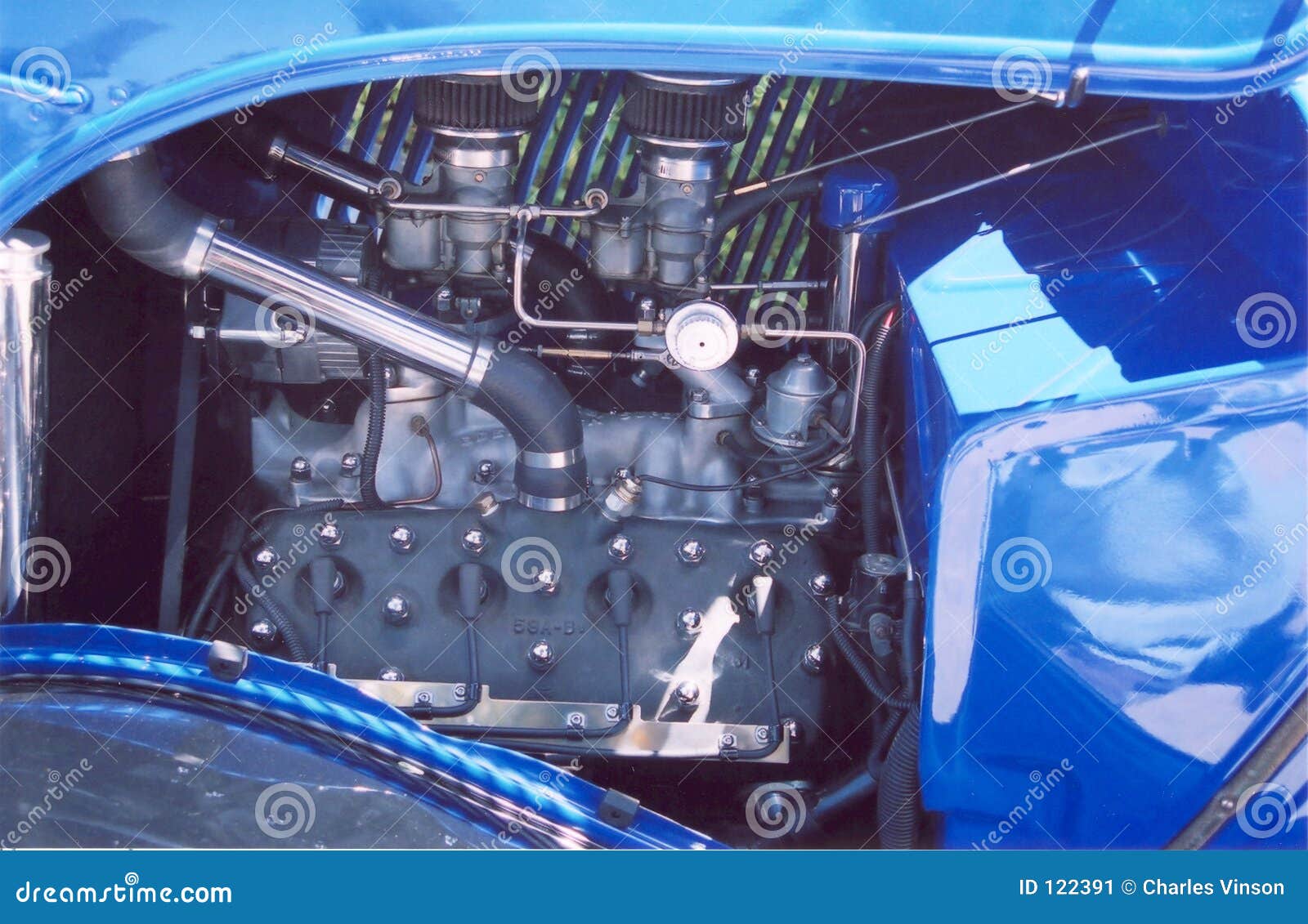 Dramatic Engine with Bright Chrome and Blue Paint Job of a Vintage Car ...