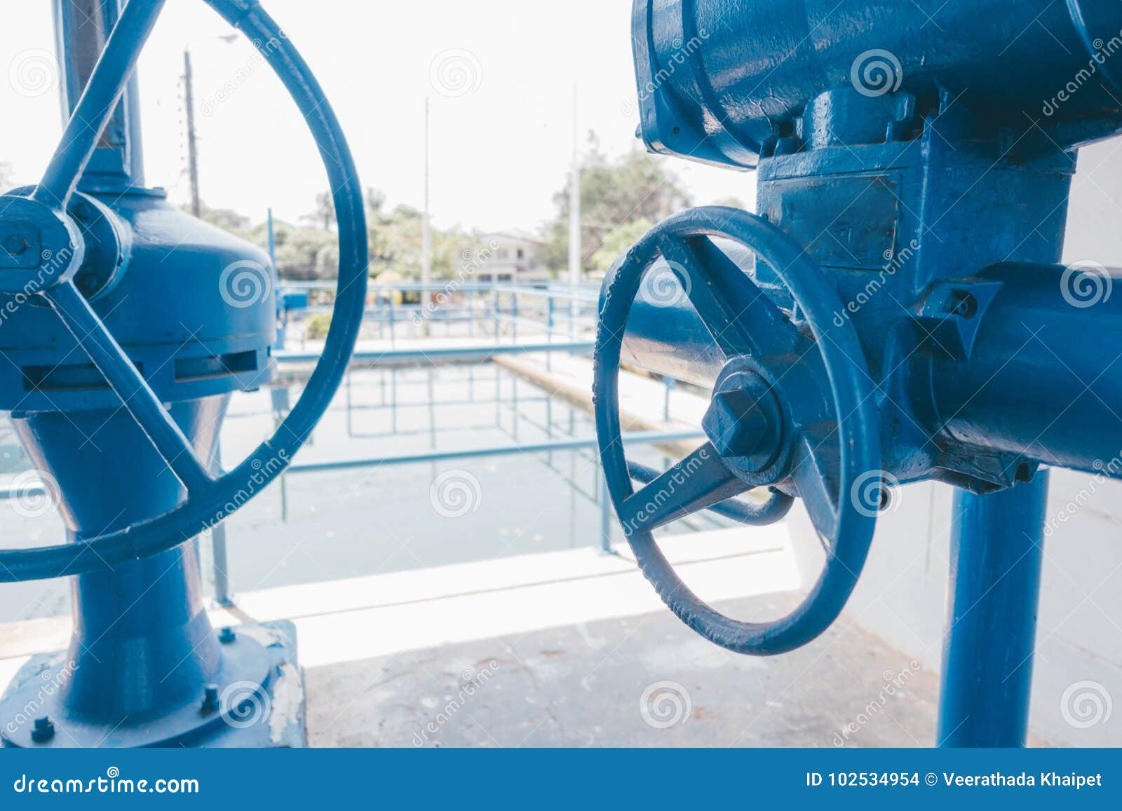 Two Big Blue Tap Or Valve Or Faucet On Water Pipe On Gray Industrial ...