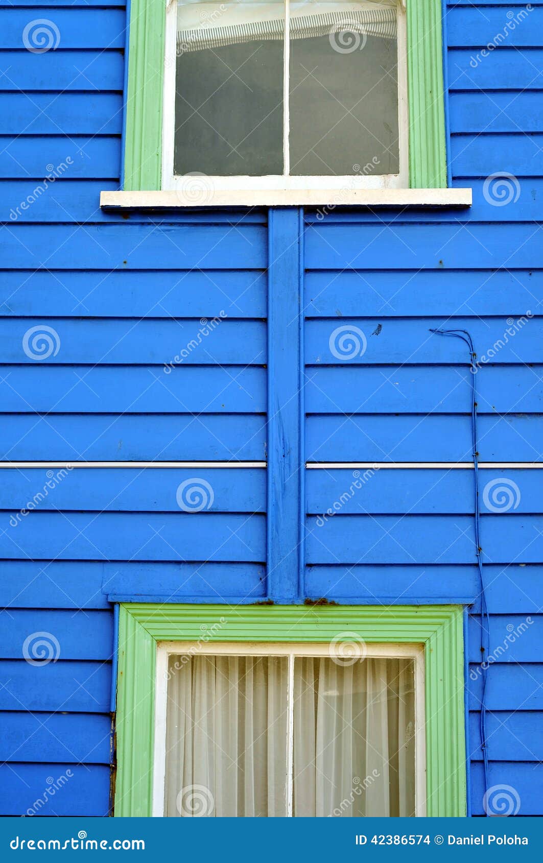 Blue Wall with Green Windows Stock Photo - Image of windows, glass ...