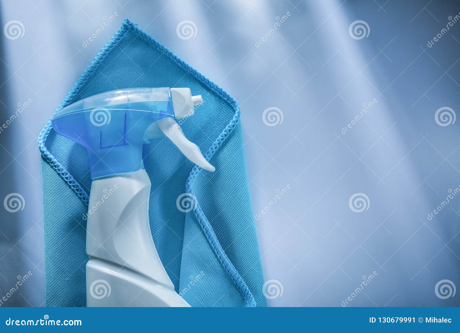 Blue Washing Rag Sprayer on White Surface Stock Image - Image of ...