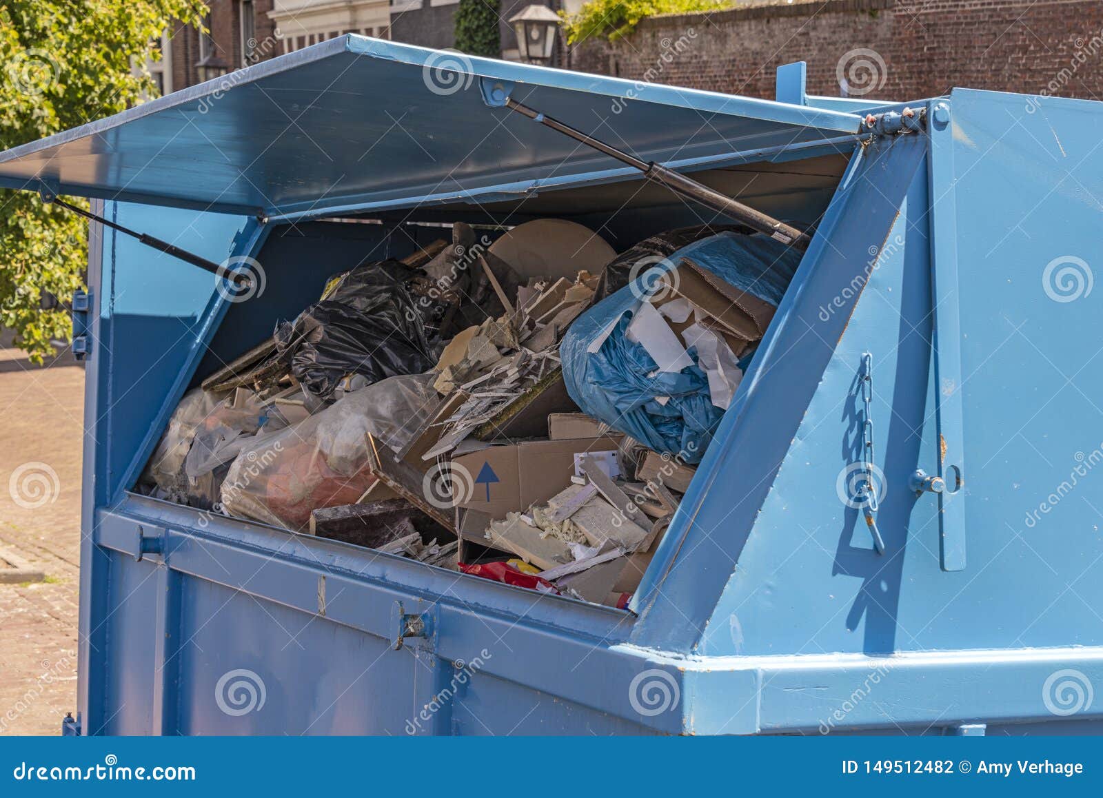 Blue Waste Container with Open Flap Stock Photo - Image of full ...
