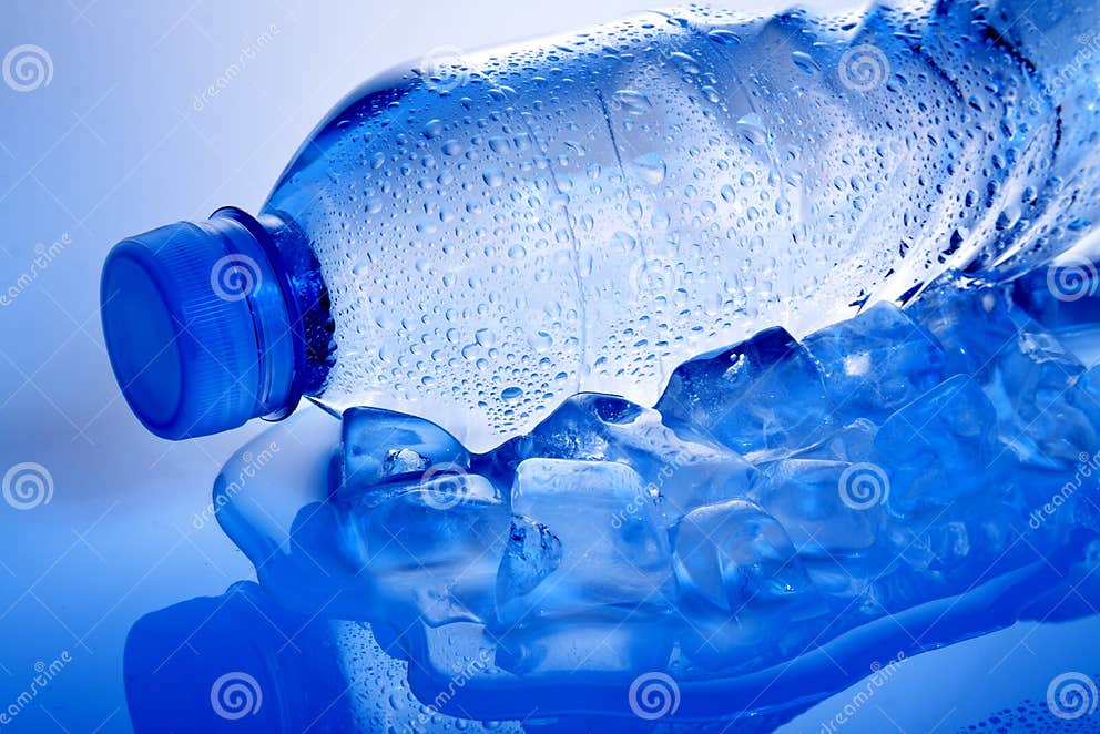 Blue water bottle on ice stock image. Image of melted - 19151171