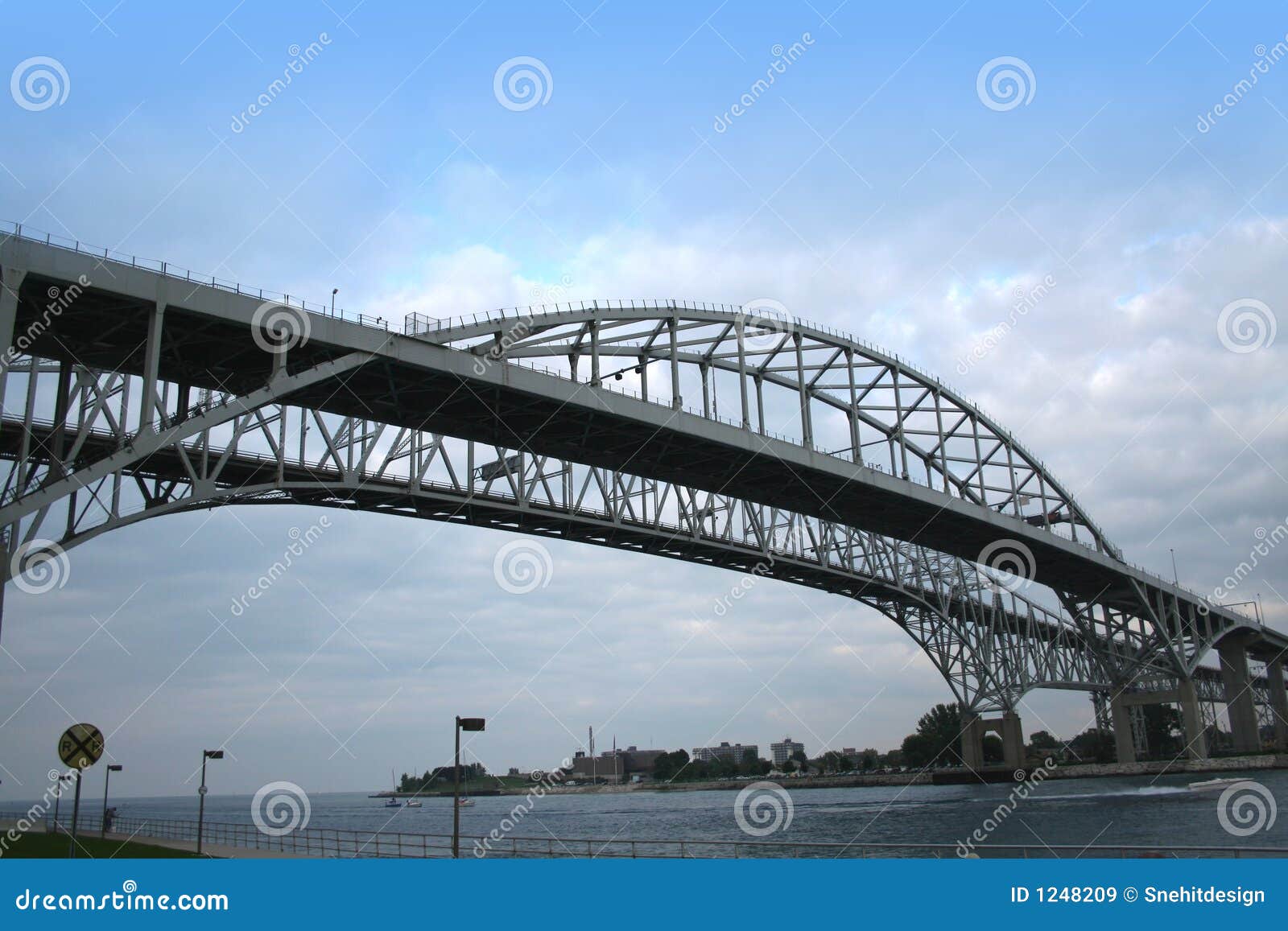 Blue water bridge stock image. Image of water, cross, grass - 1248209