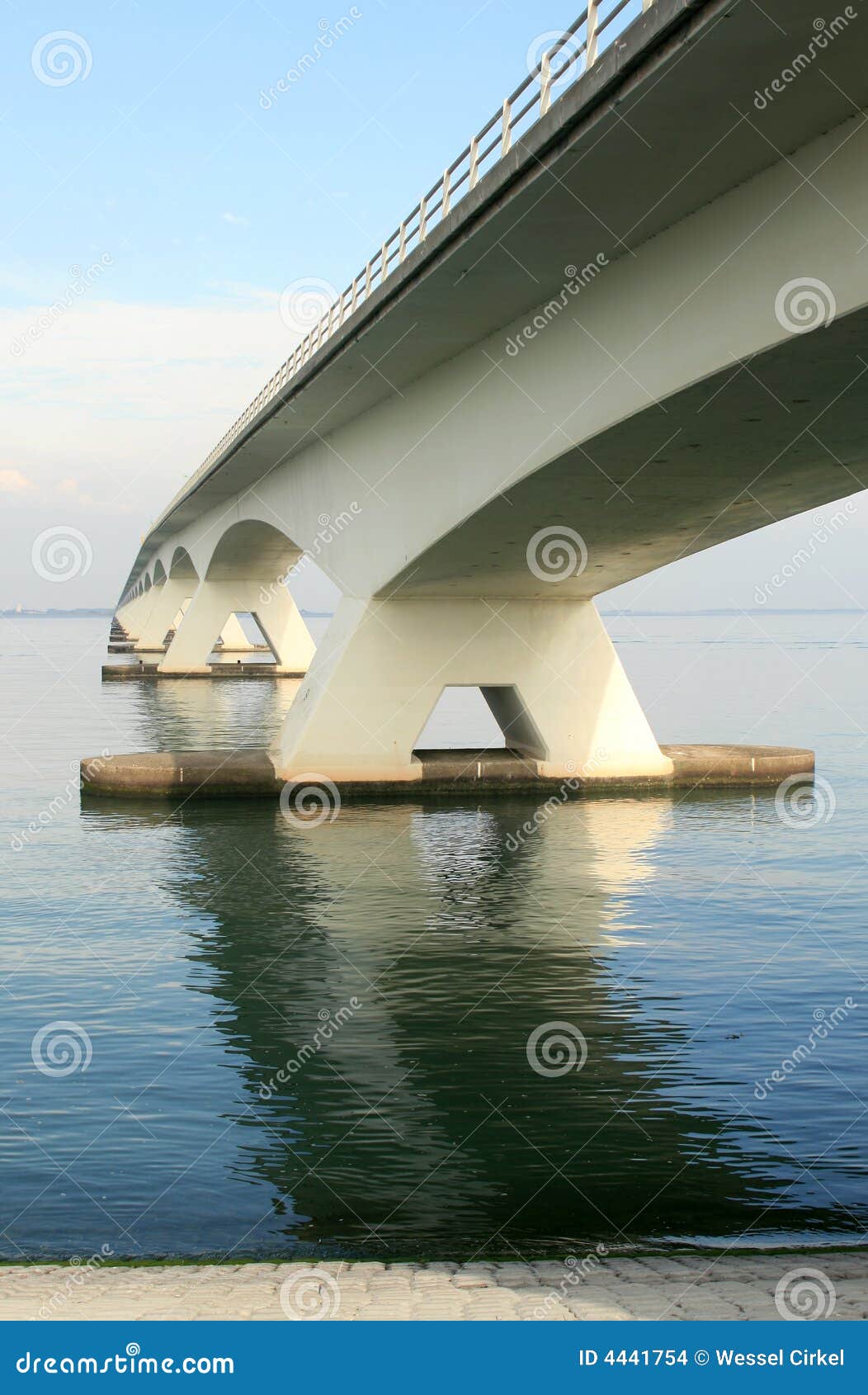 Blue water and bridge stock photo. Image of holland, mirroring - 4441754