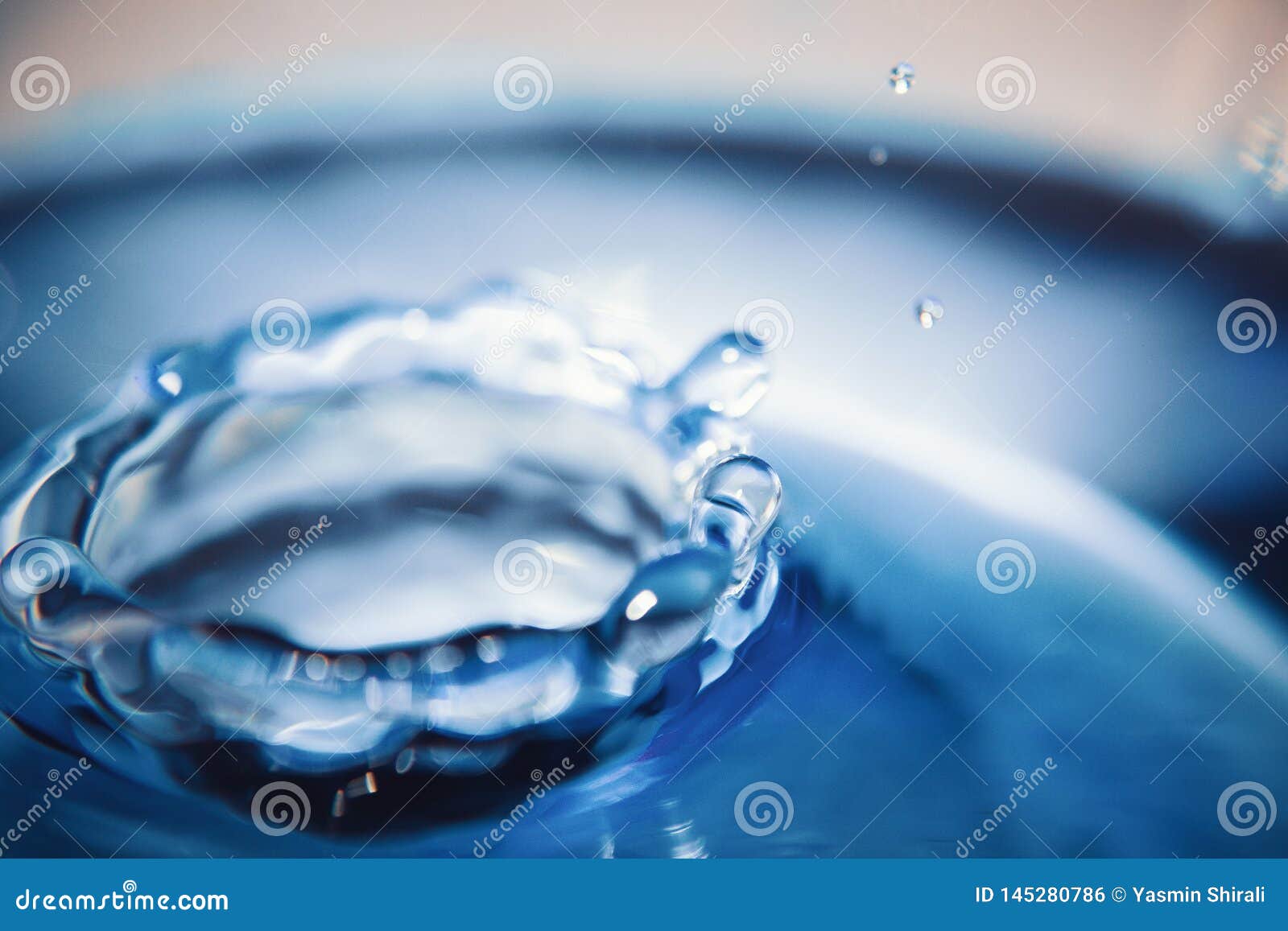 Blue water drop splashing stock photo. Image of life - 145280786