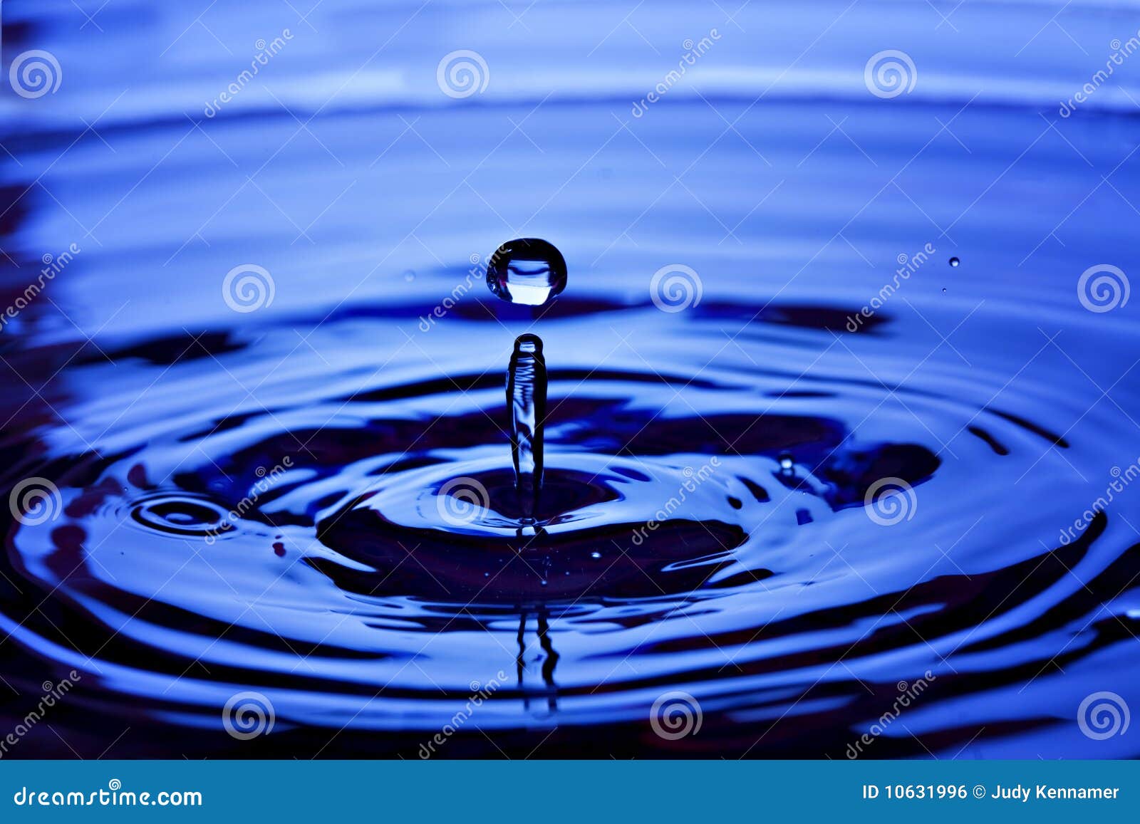 Blue water drop and splash stock photo. Image of drop - 10631996