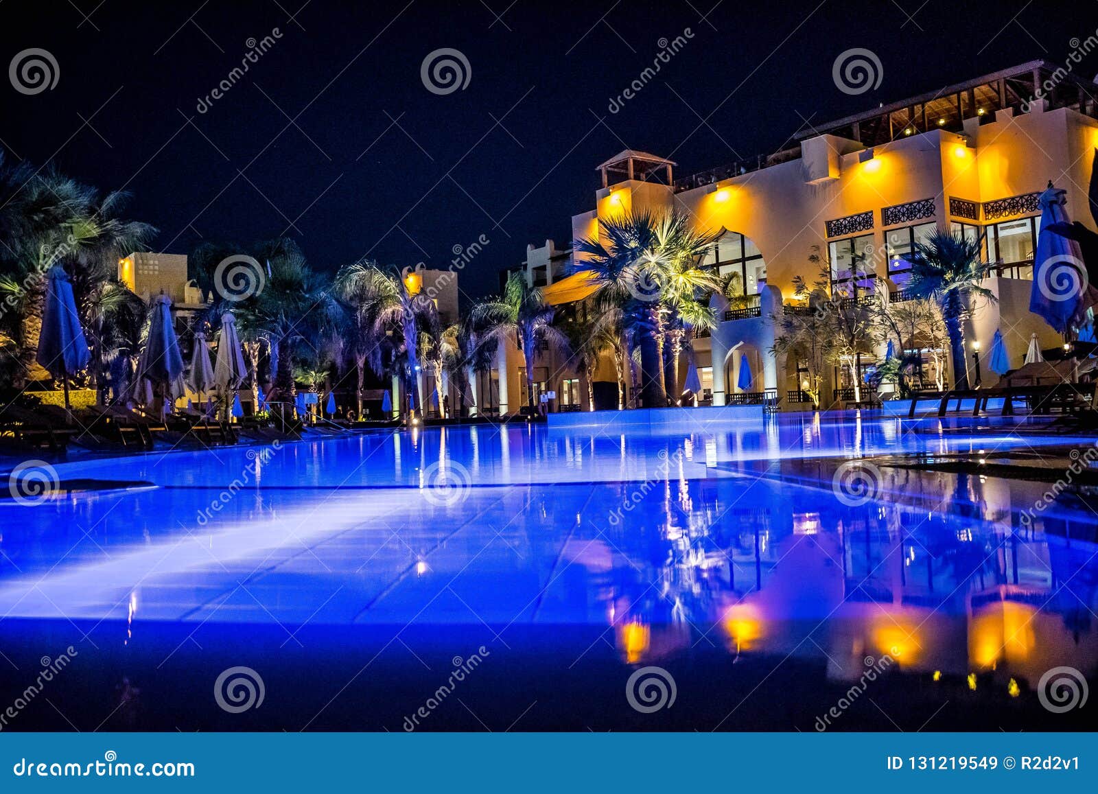 Blue Water Pool. Reflection of Lantern Light at Night Stock Image ...