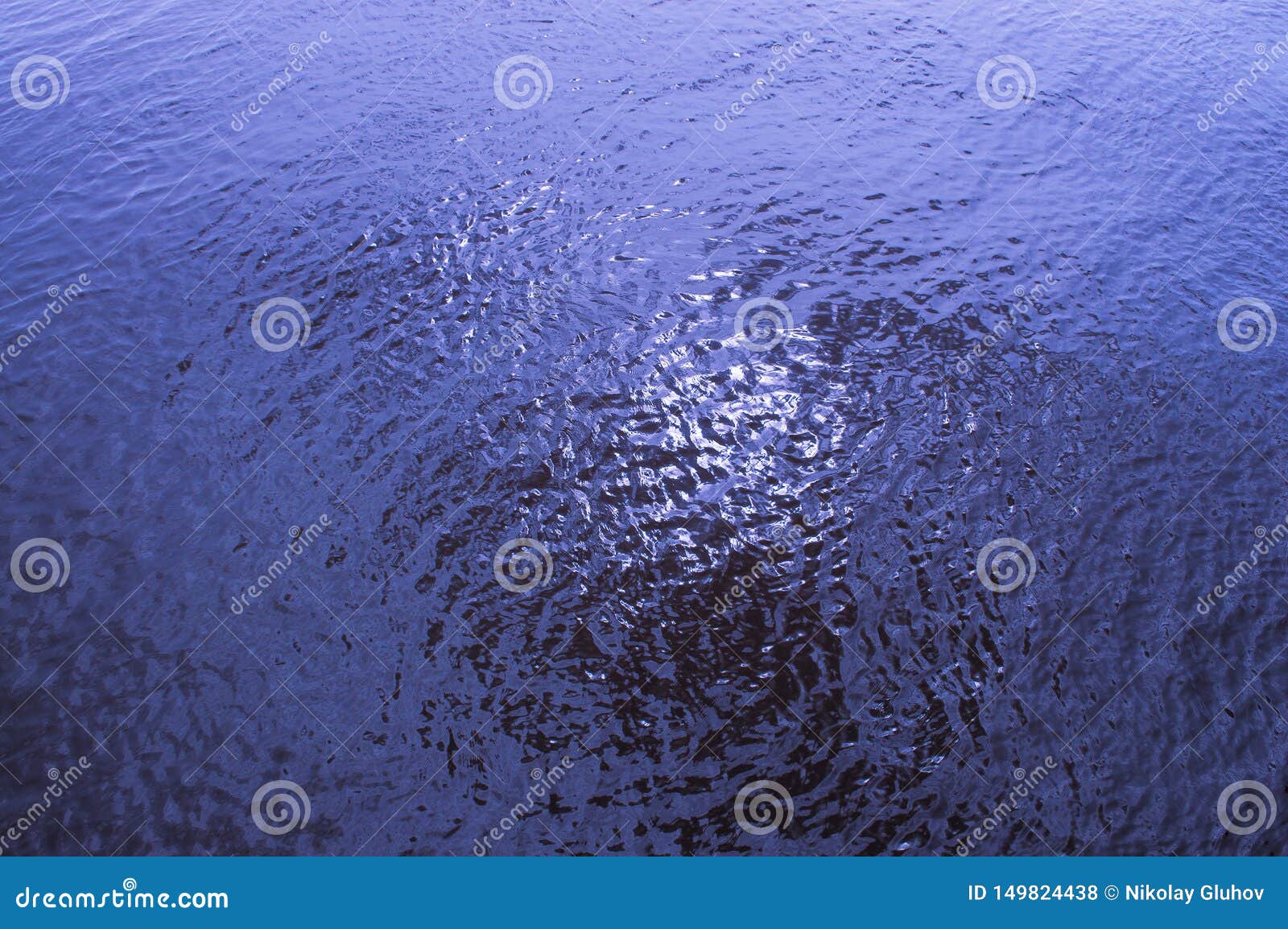 Blue Water with Ripples and Sun Flare Stock Photo - Image of water ...