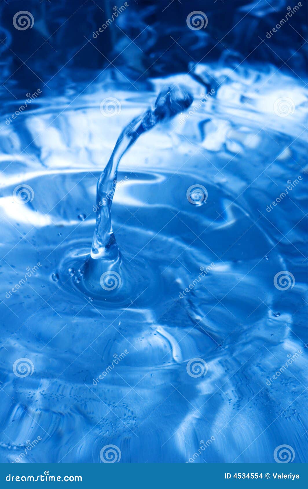 Blue water splash stock photo. Image of blue, circle, concentric - 4534554