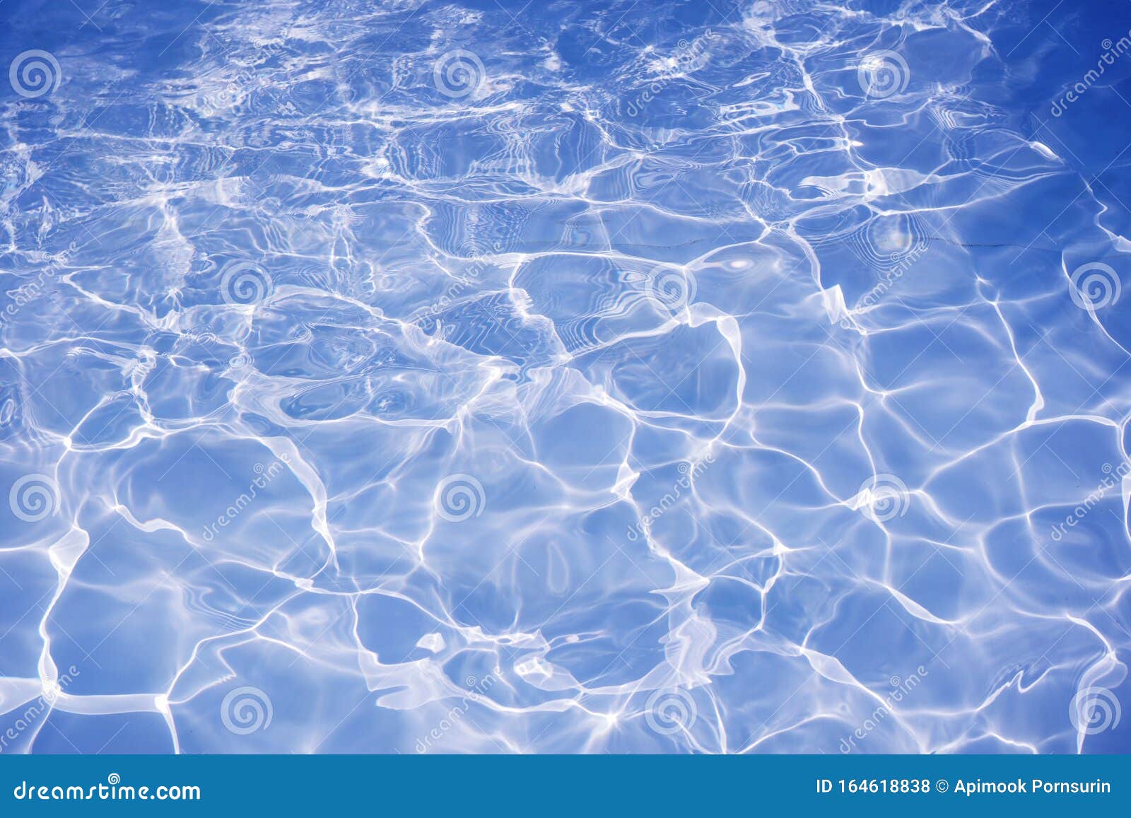 Blue Water Surface with Bright Sun Light Reflections, Water in Swimming ...